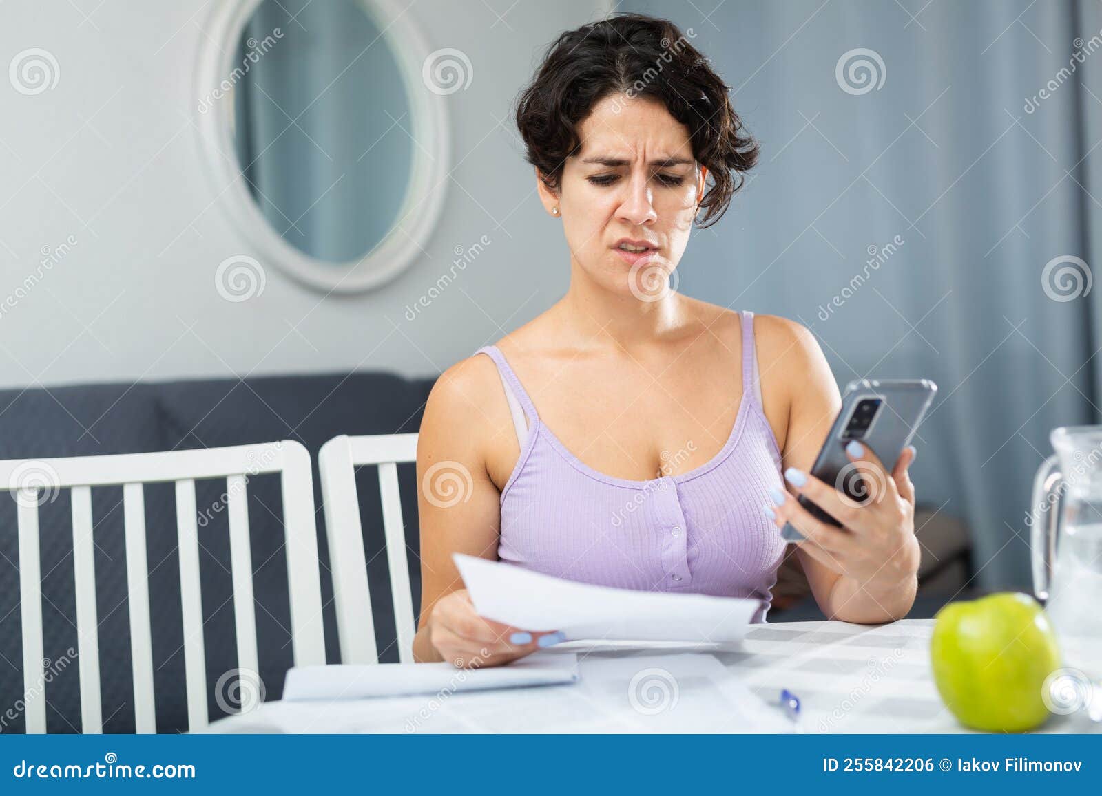 Frustrated Brunette Woman is Unhappy with Payment Document for ...