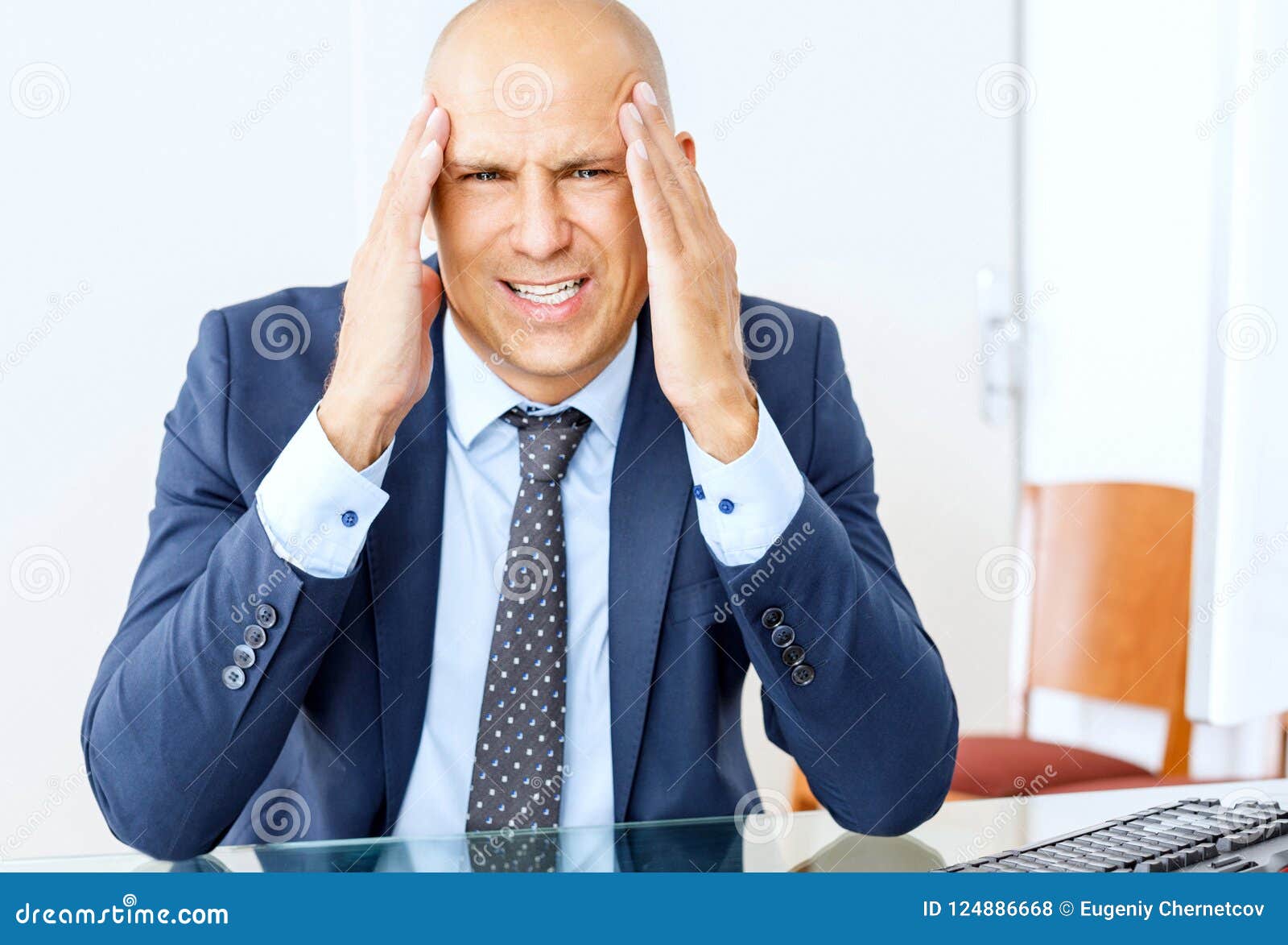 Frustrated Business Man Working at Office Interior Stock Photo - Image ...