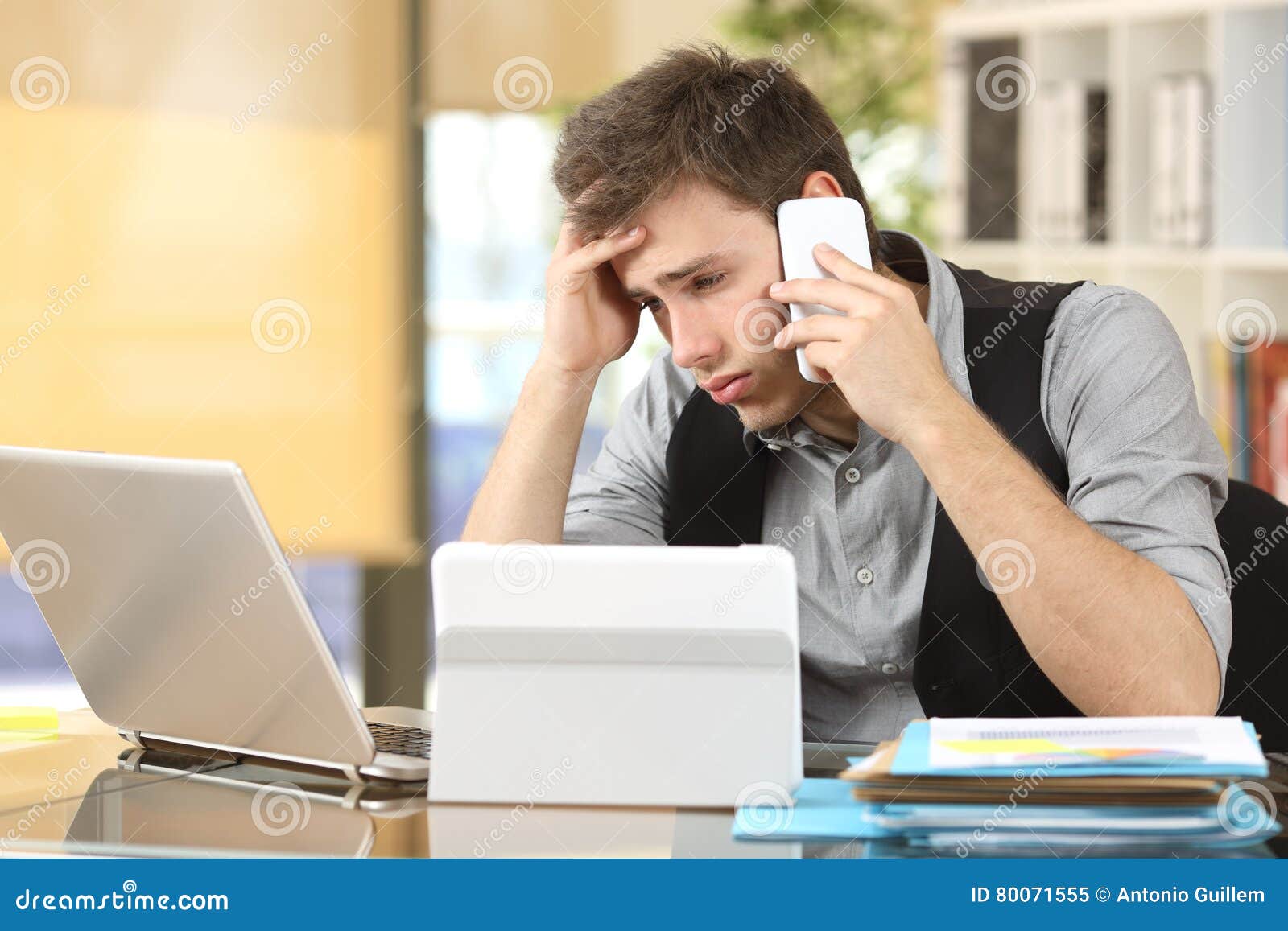 Frustrated Businessman with Multiple Devices Stock Image - Image of ...