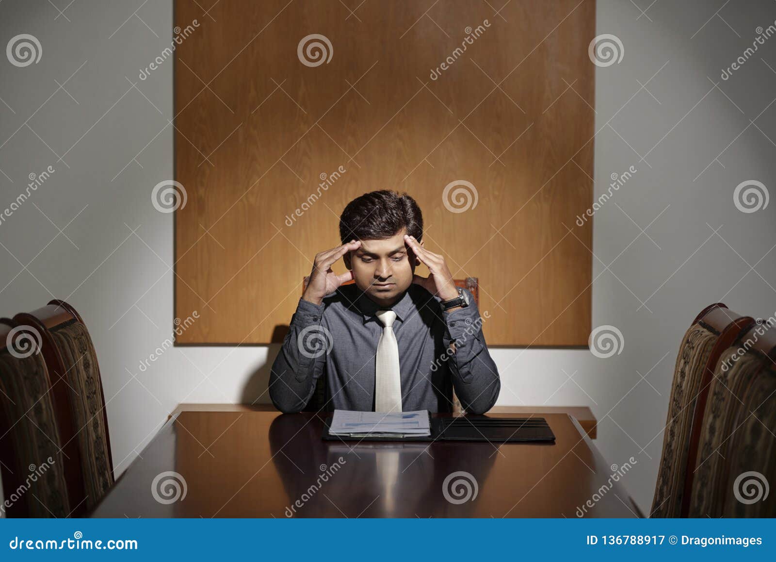 Frustrated businessman stock image. Image of document - 136788917