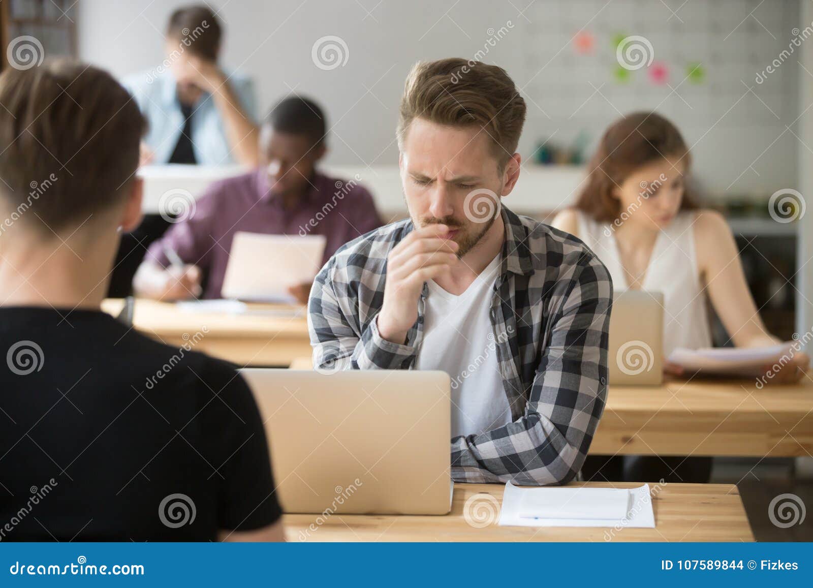 Frustrated Businessman Working on Laptop in Co-working, Thinking Stock ...