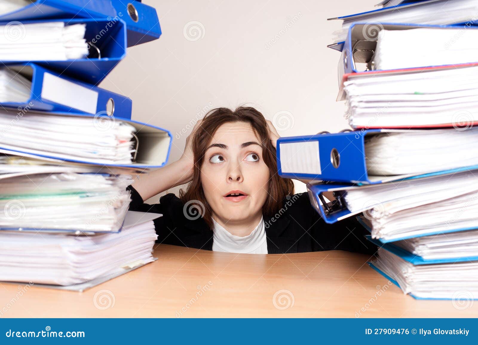 Frustrated Businesswoman with Stack of Folders Stock Photo - Image of ...