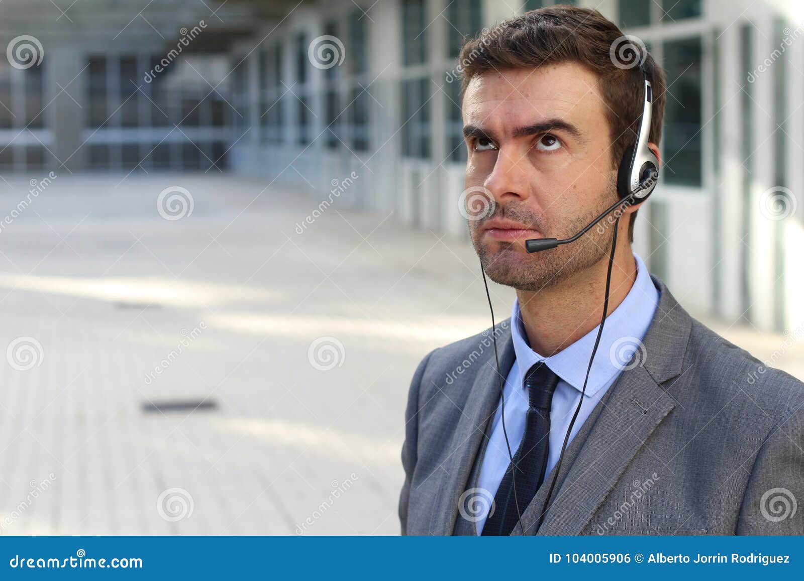 Frustrated Customer Service Worker Rolling His Eyes Stock Photo - Image ...