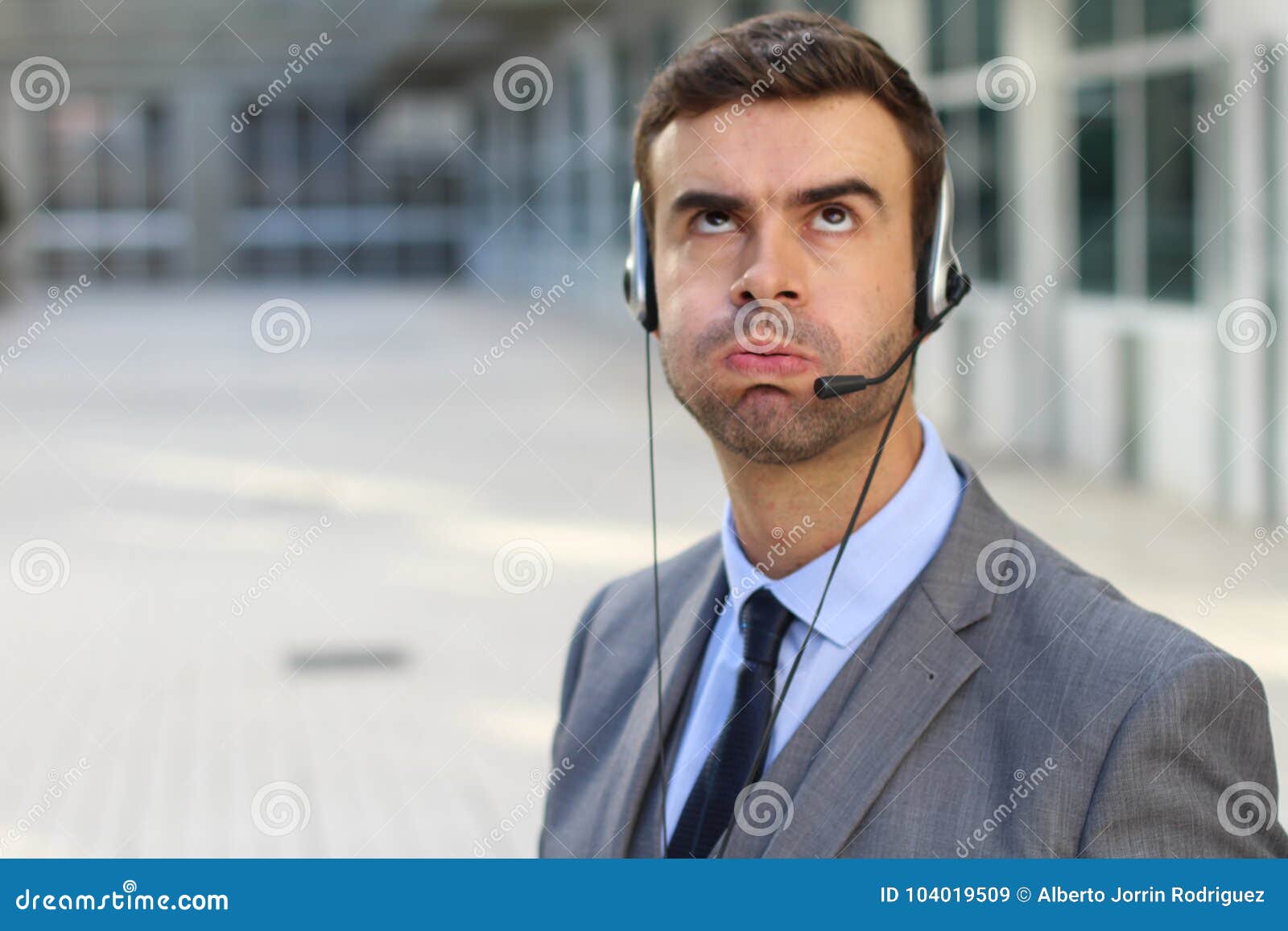 Frustrated Customer Service Worker Rolling His Eyes Stock Image - Image ...
