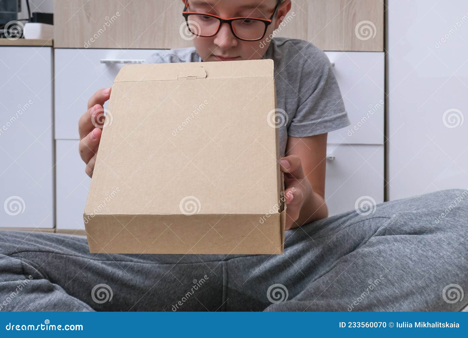 A Frustrated Disappointed Boy Received an Empty Parcel, Package Stock ...