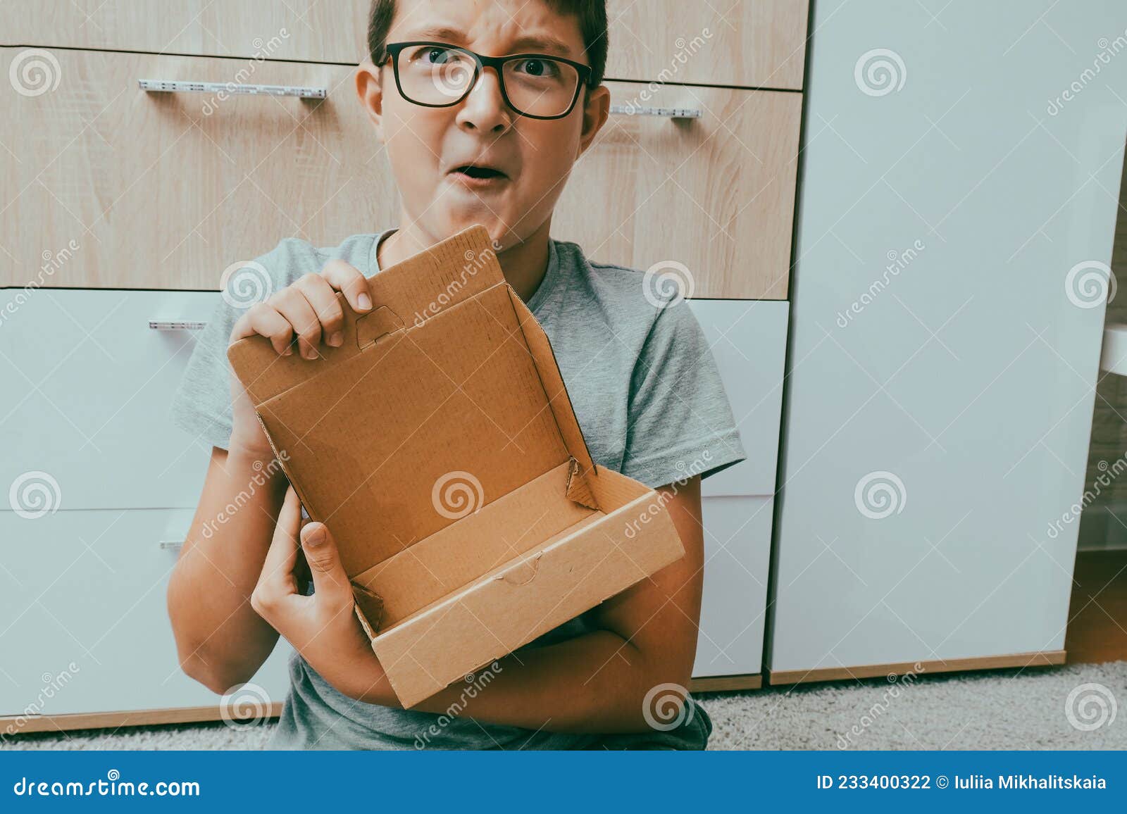 A Frustrated Disappointed Boy Received an Empty Parcel, Package Stock ...