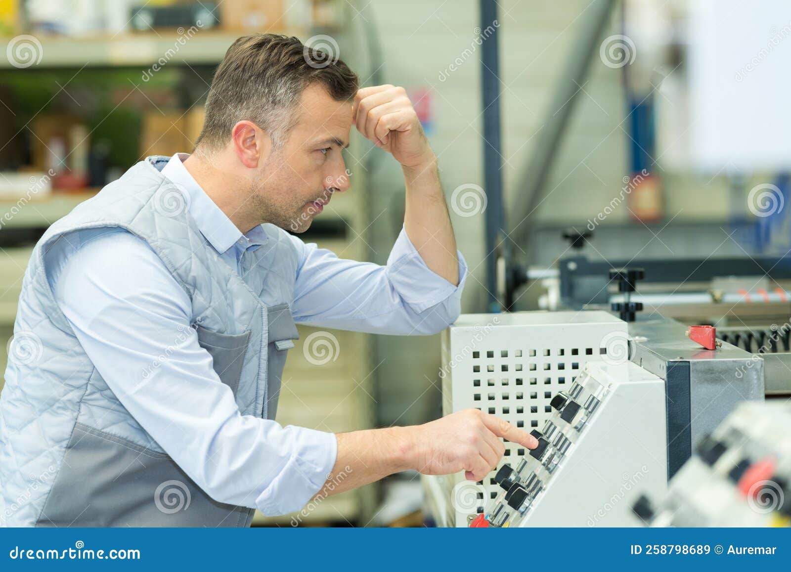 Frustrated Engineer Working on Machiner in Factory Stock Image - Image ...