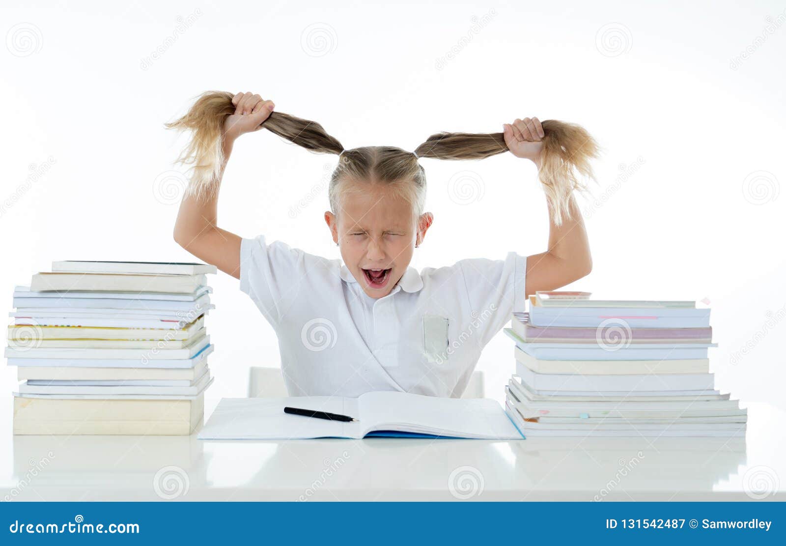 Frustrated Little Schoolgirl Feeling a Failure Unable To Concentrate in ...