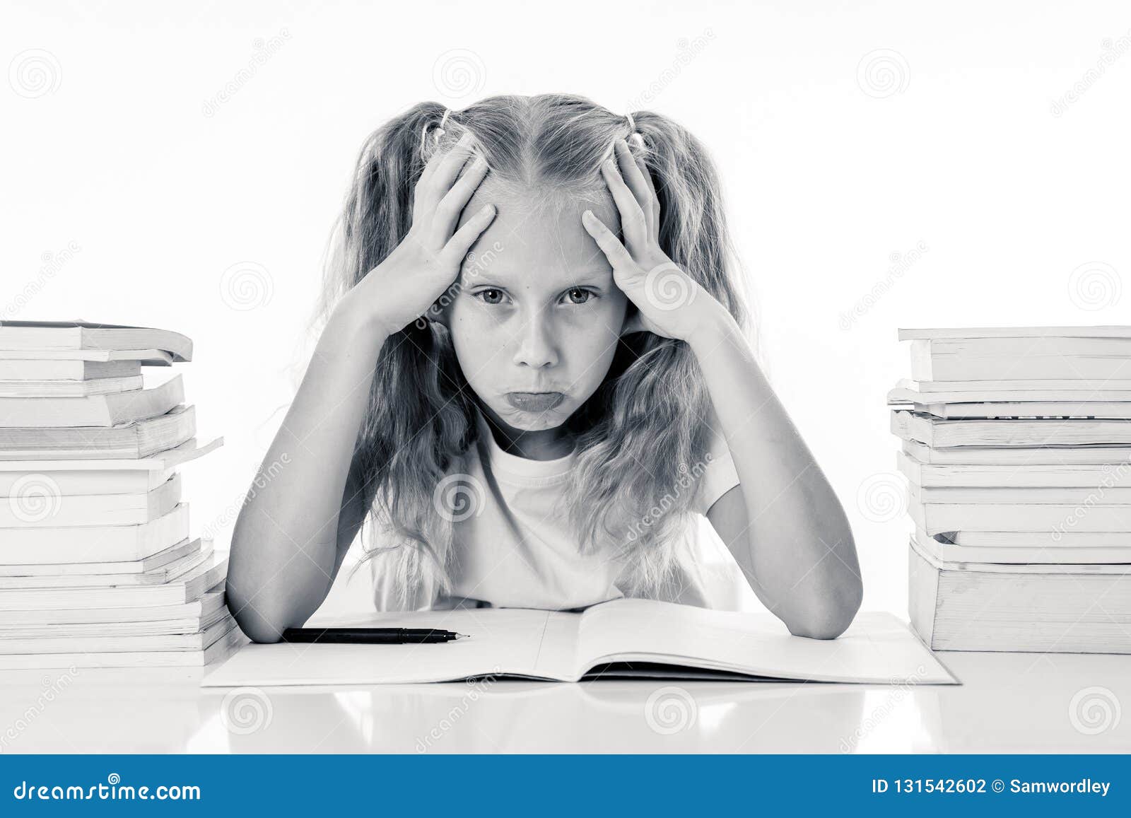 Frustrated Little Schoolgirl Feeling a Failure Unable To Concentrate in ...