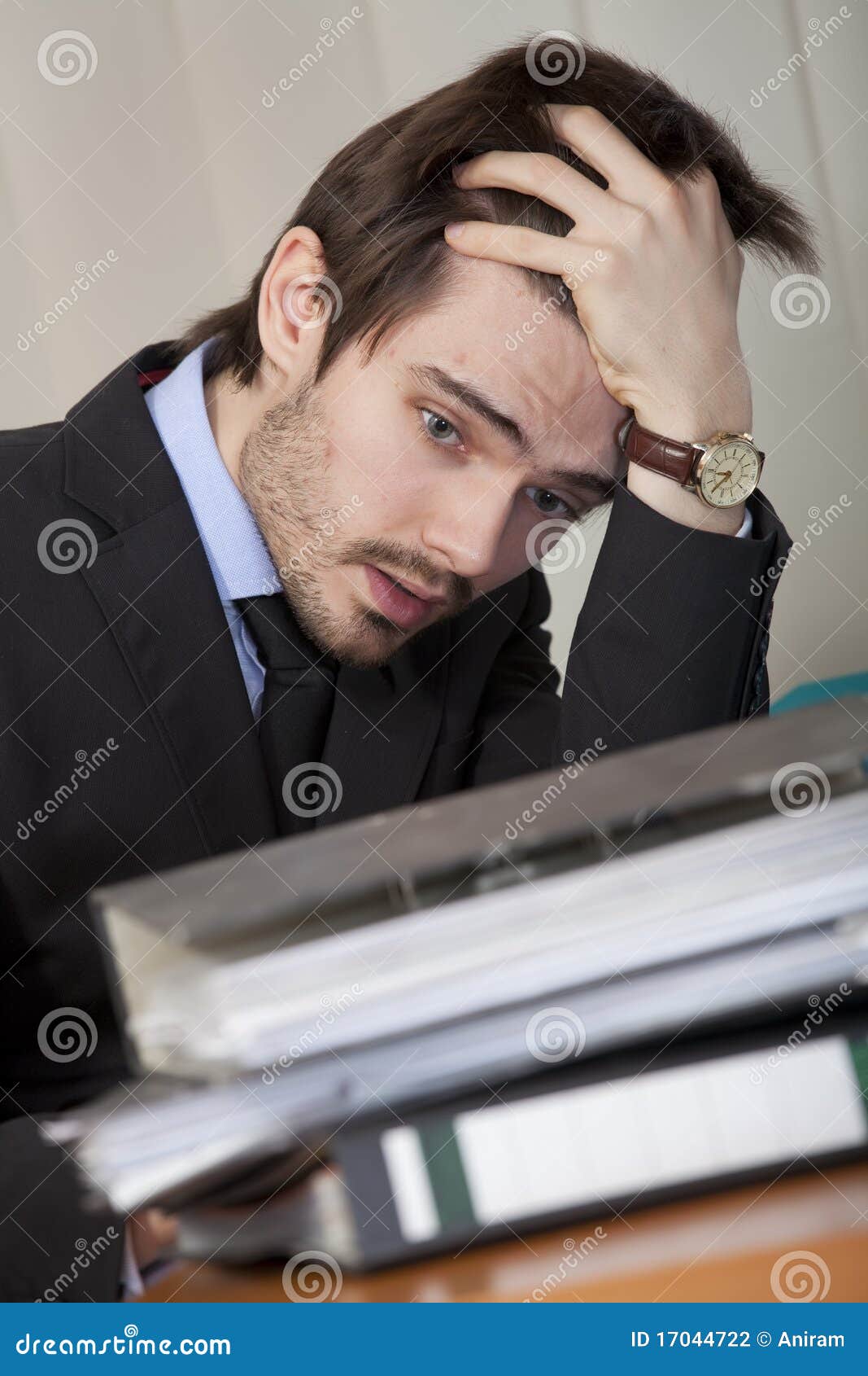 Frustrated Man with Folders Stock Photo - Image of upset, desk: 17044722