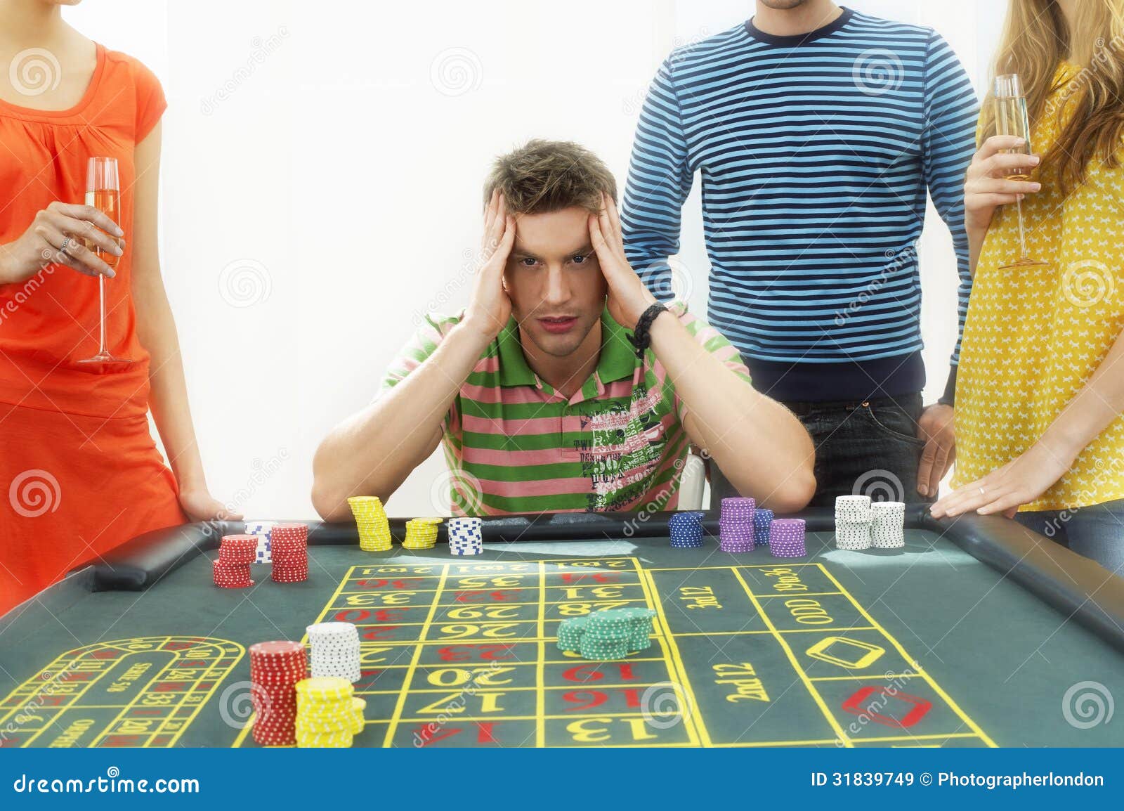 Frustrated Man at Roulette Table with Friends Stock Image - Image of ...