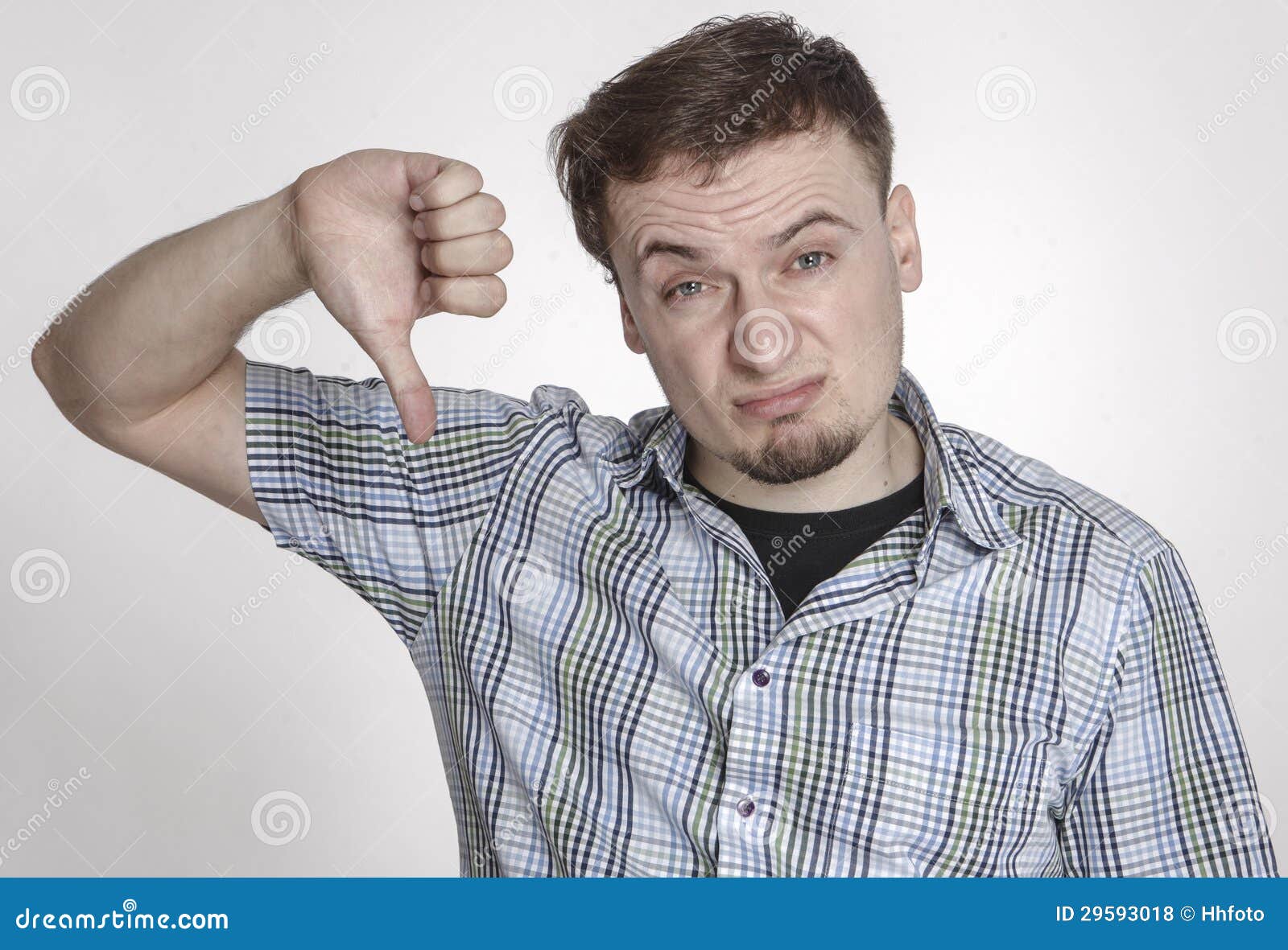 Frustrated Man Showing Thumbs Down Stock Photo - Image of white, young ...