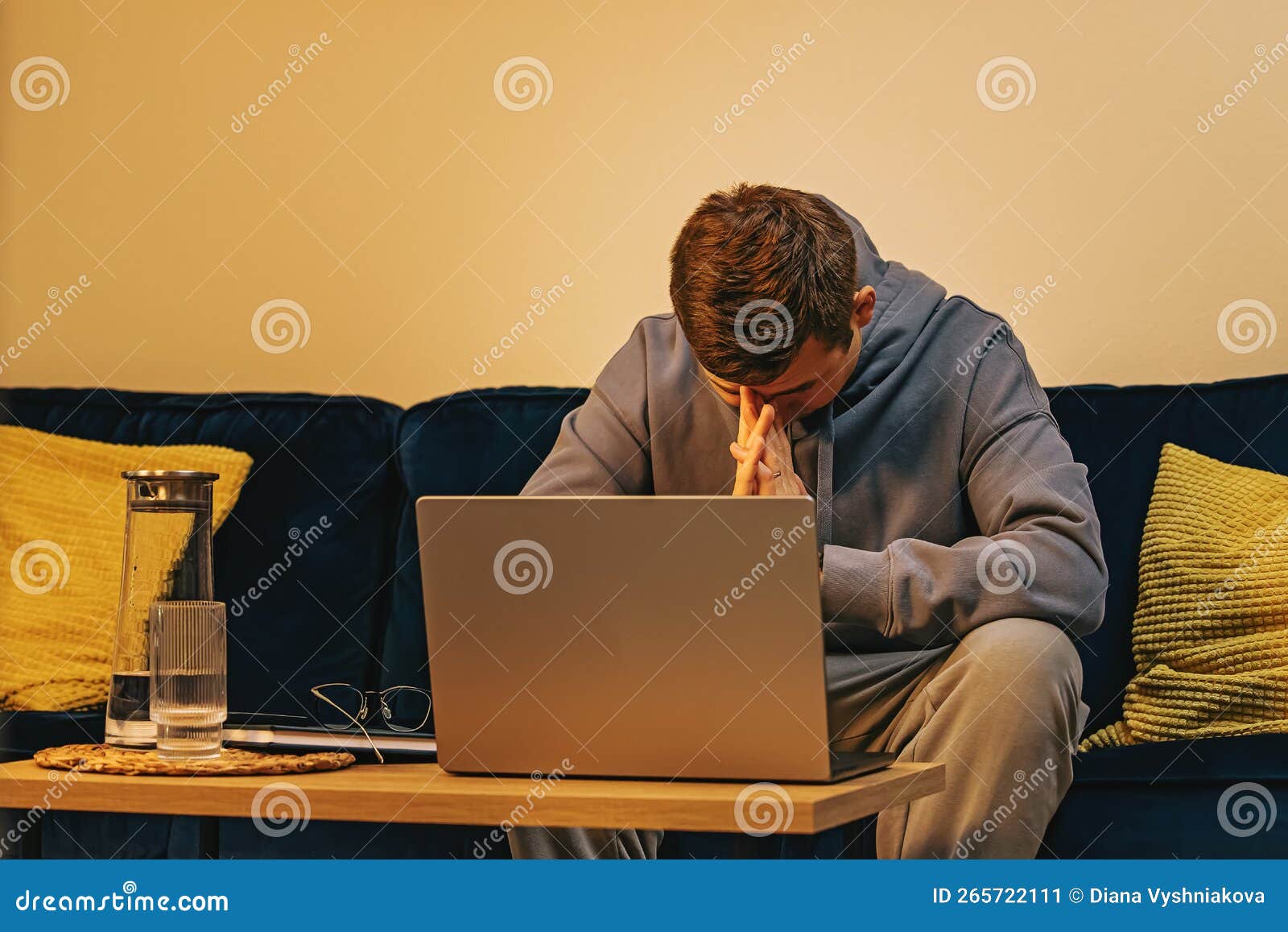 Frustrated Man Sitting on the Sofa in Front of His Laptop Stock Image - Image of frustration ...