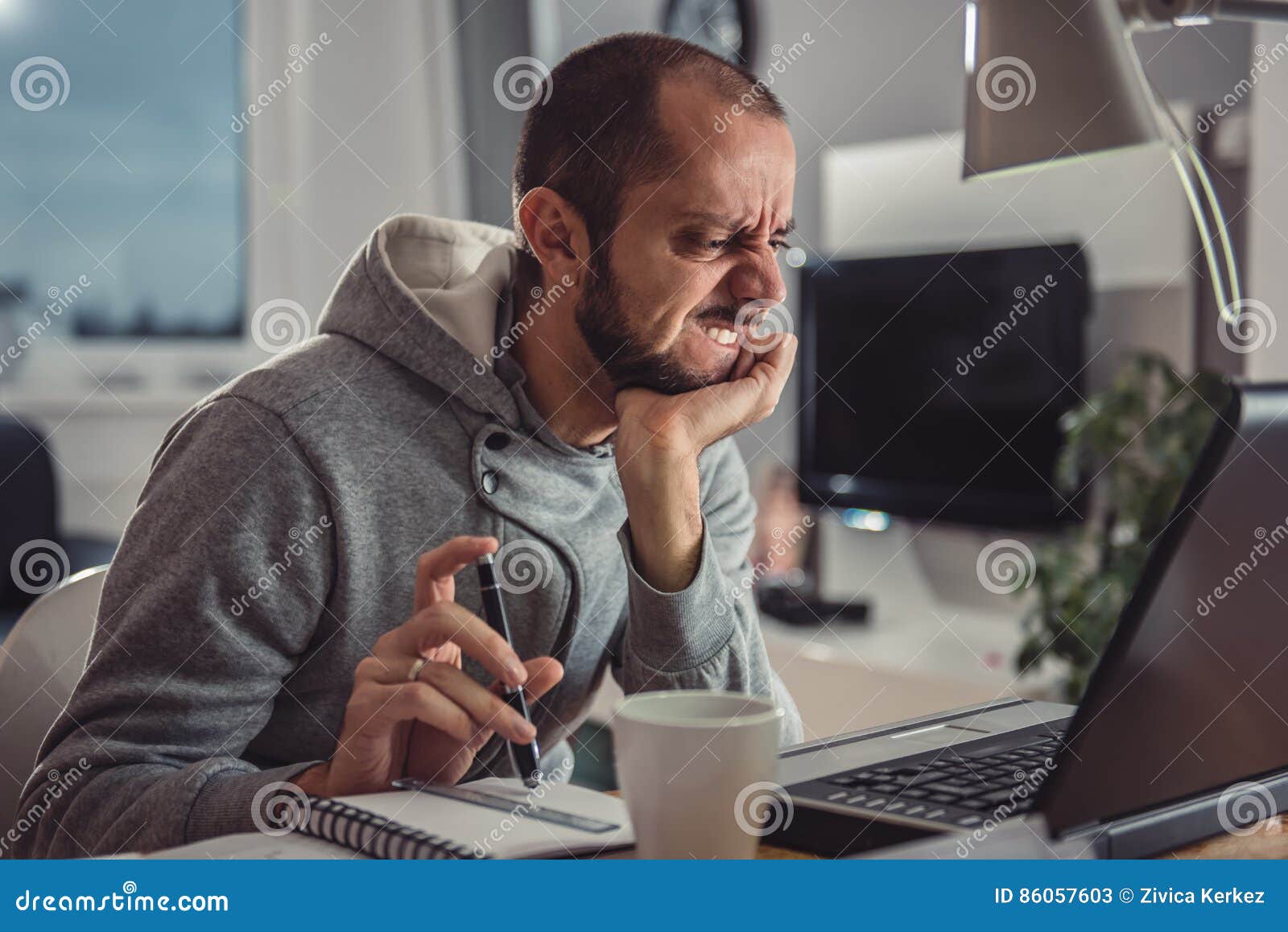 Frustrated Man Working on Laptop Stock Image - Image of caucasian, home ...