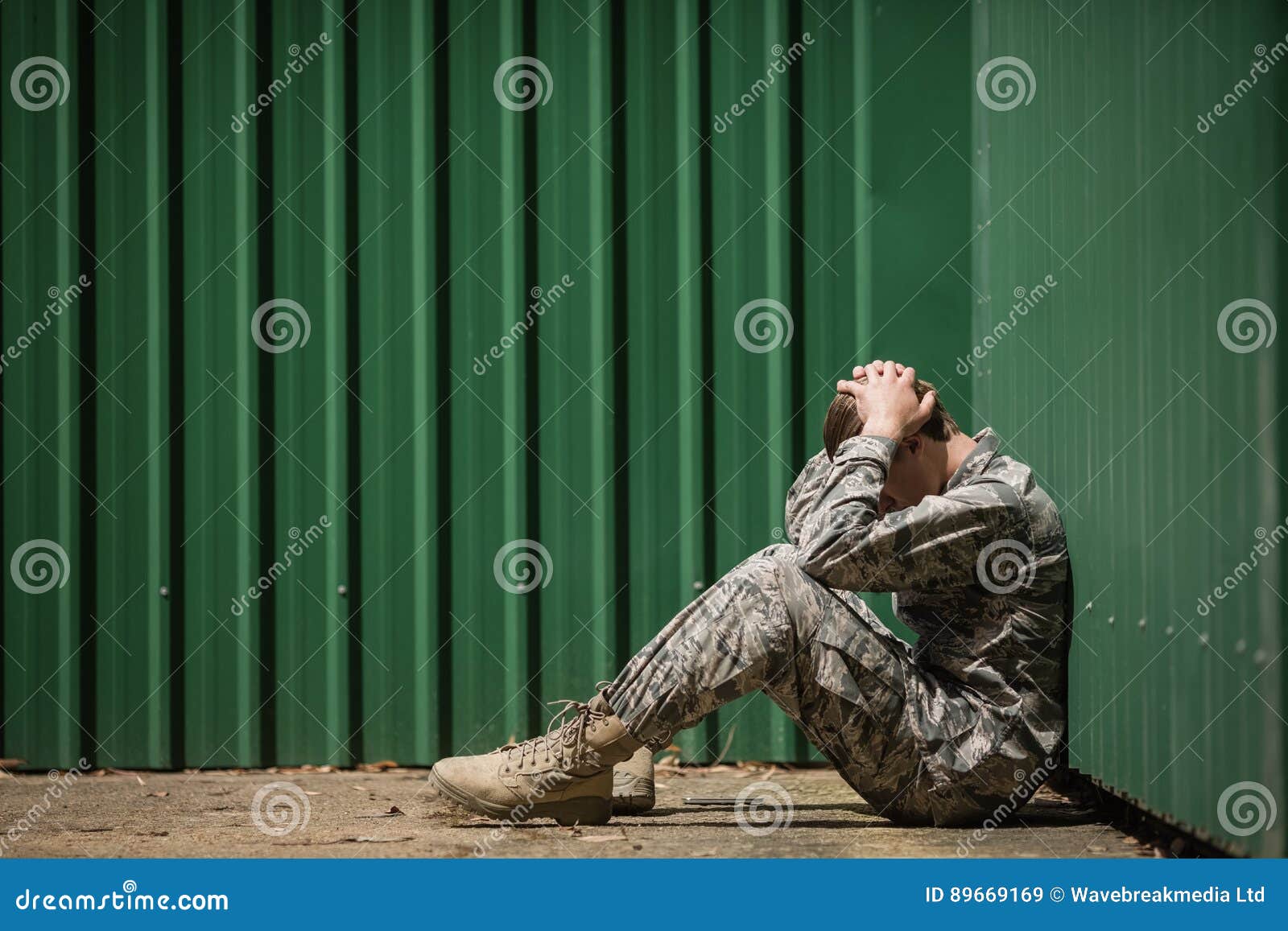 Frustrated Military Soldier Sitting with Hands on Head Stock Image ...