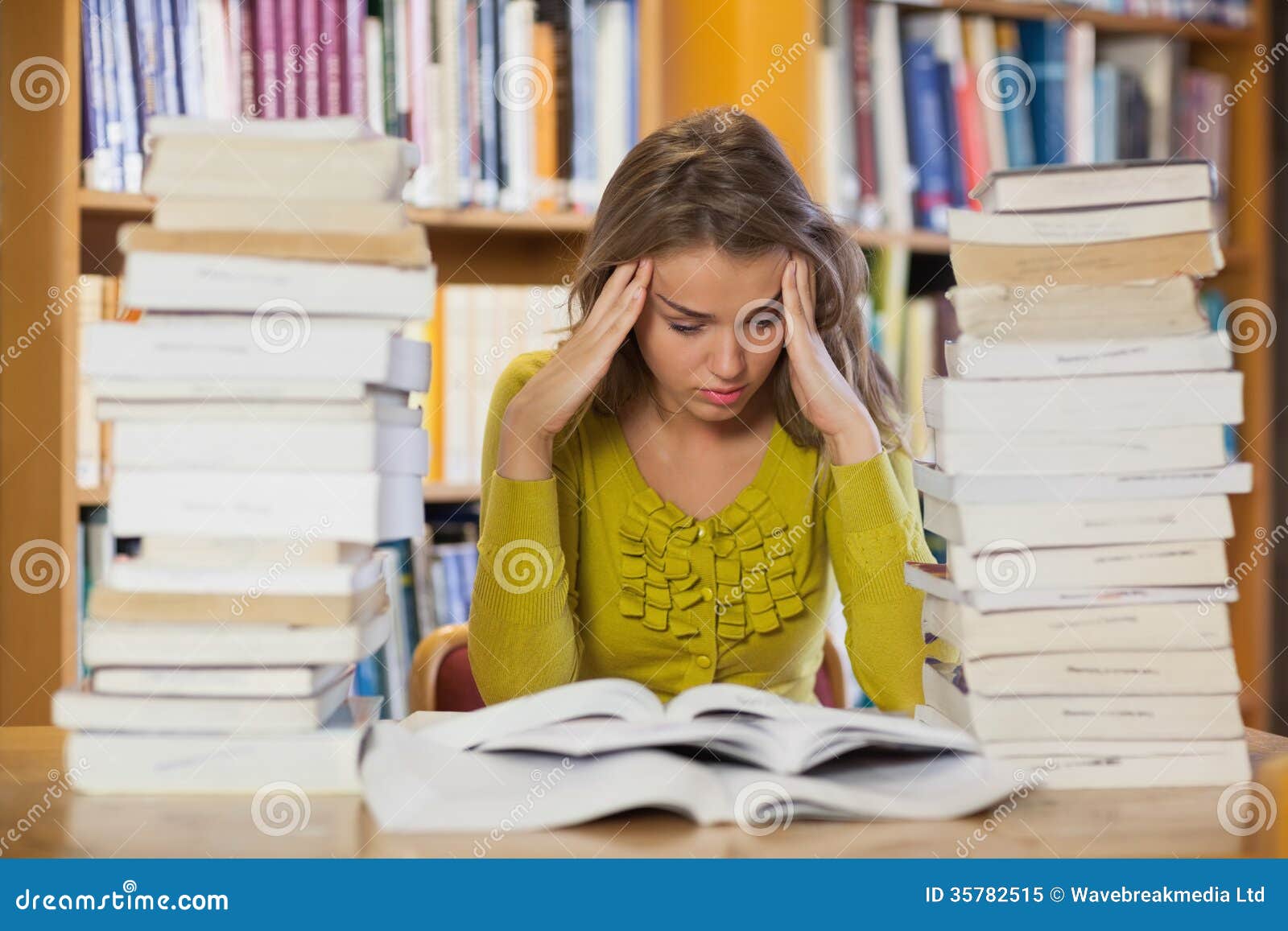 Frustrated Pretty Student Studying between Piles of Books Stock Image ...