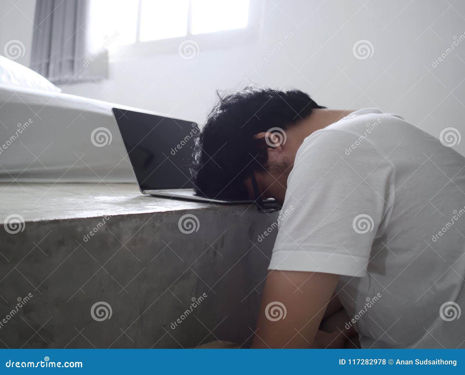 Frustrated Upset Young Asian Man with Head Down on Computer Laptop ...