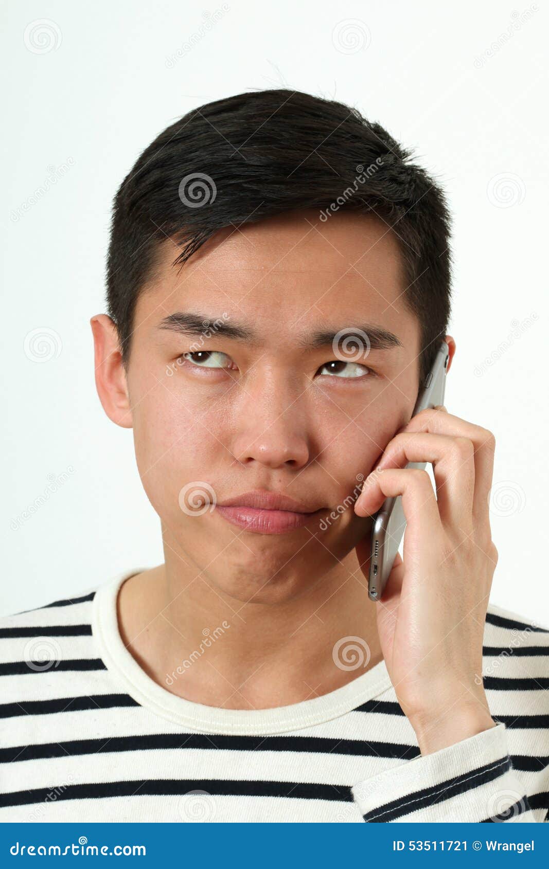 Frustrated Young Asian Man Using a Smartphone Stock Image - Image of ...