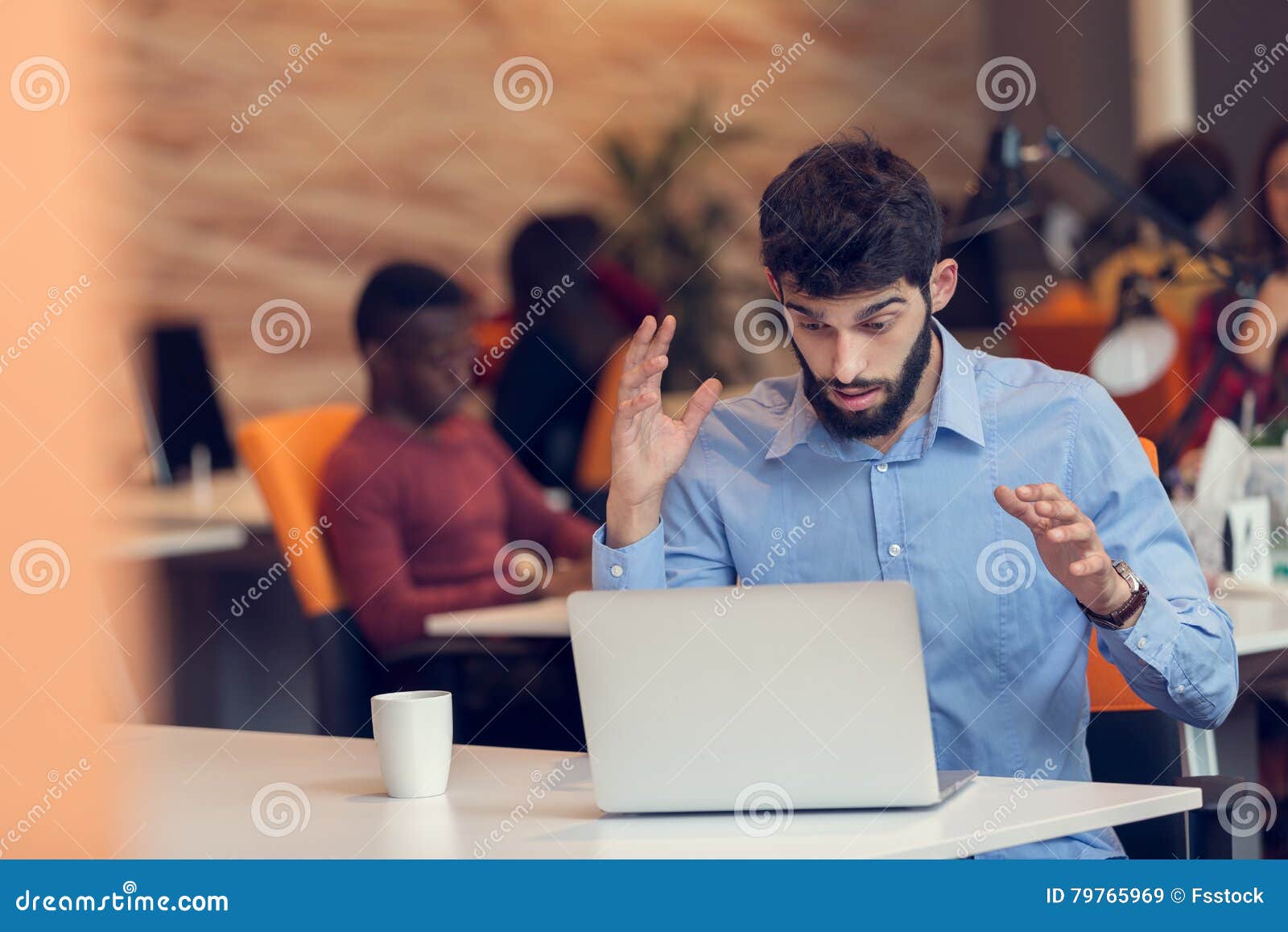 Frustrated Young Business Man Working on Computer at Modern Startup ...