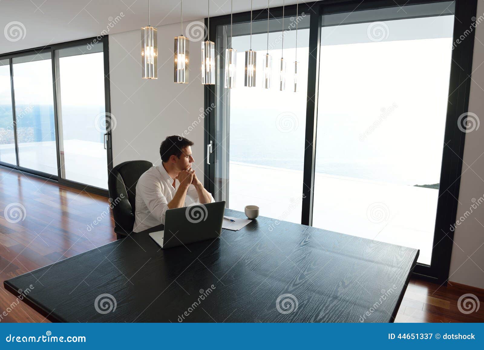 Frustrated Young Business Man Working on Laptop Computer at Home Stock ...