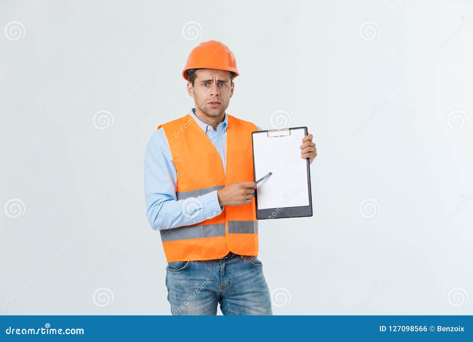 Frustrated Young Engineer with Hardhat and Reflective Vest Checking on ...