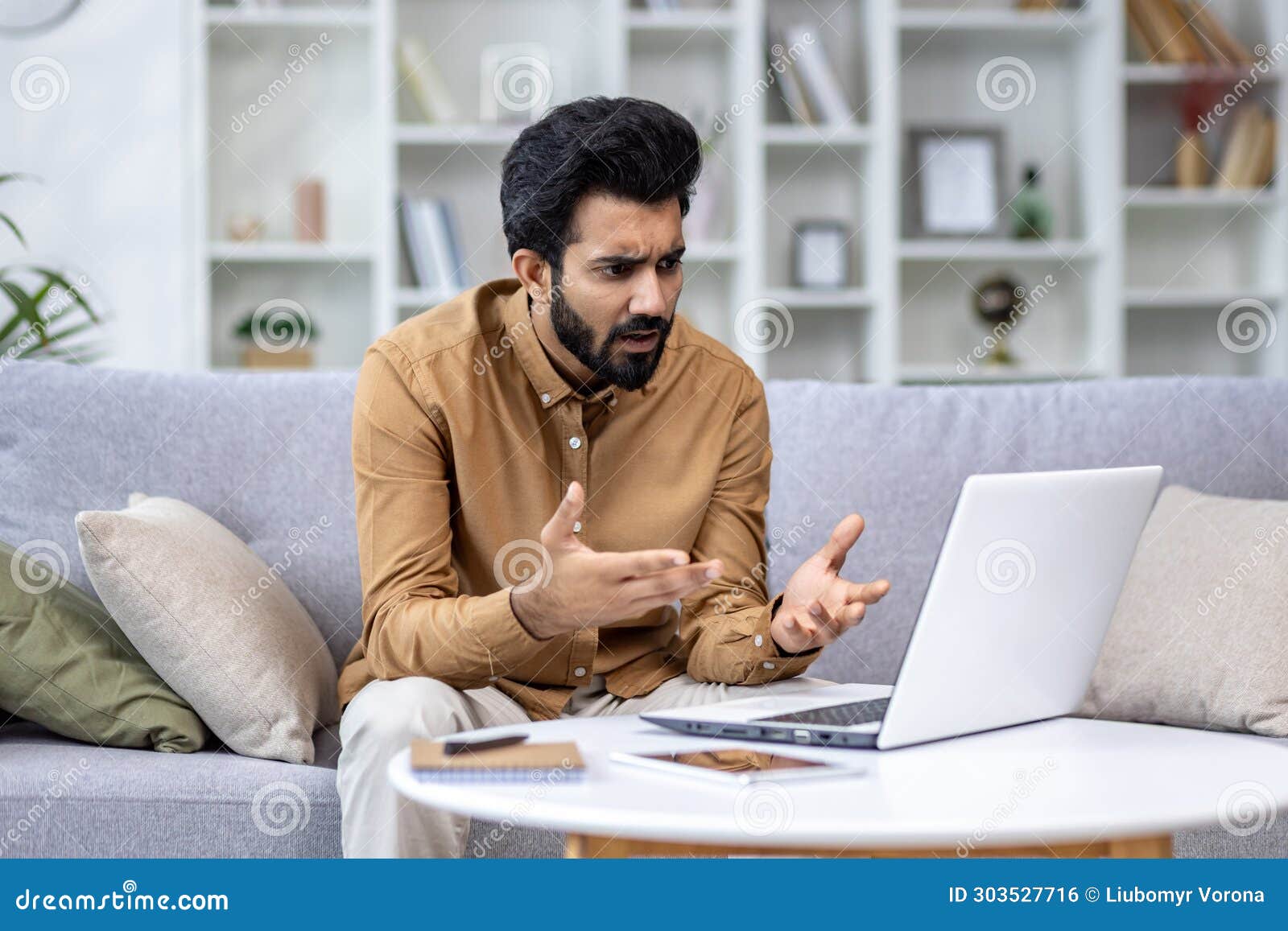 Frustrated Young Man with Beard Experiencing Computer Problems Working ...