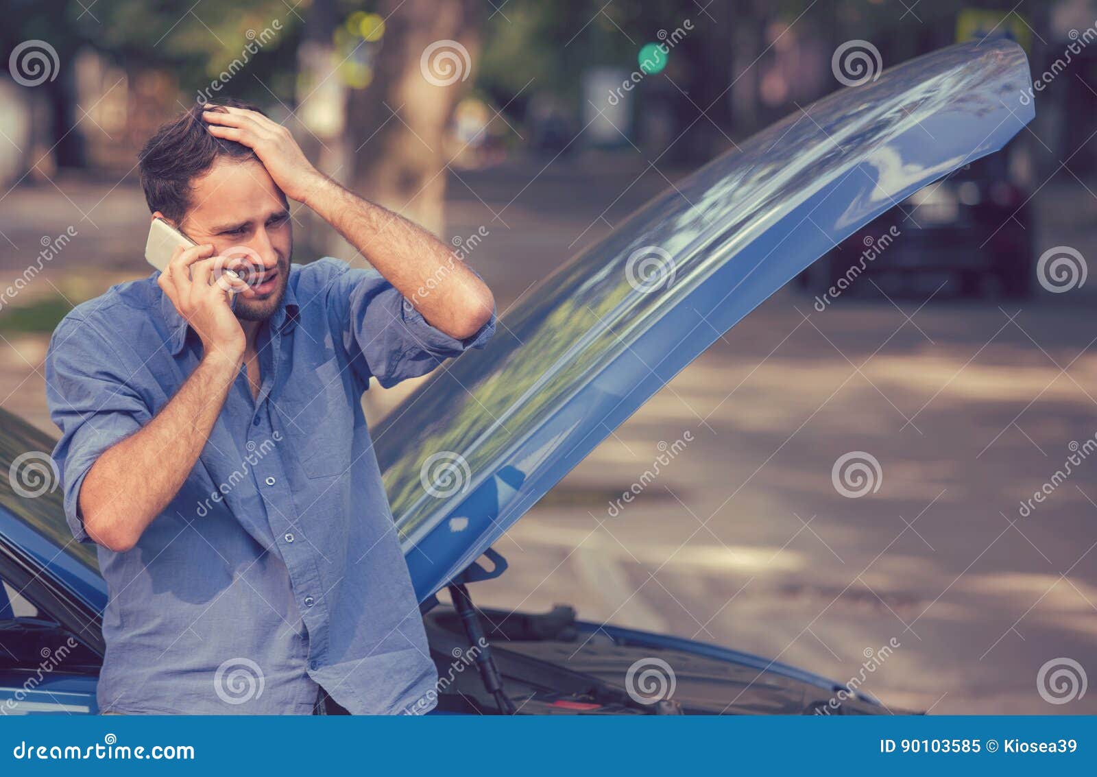 Frustrated Young Man Calling Roadside Assistance after Breaking Down ...