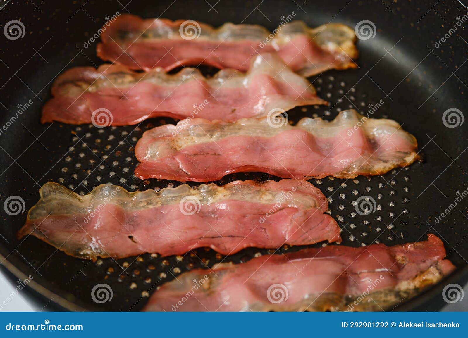 Frying Bacon in a Frying Pan Stock Photo - Image of thin, selective ...