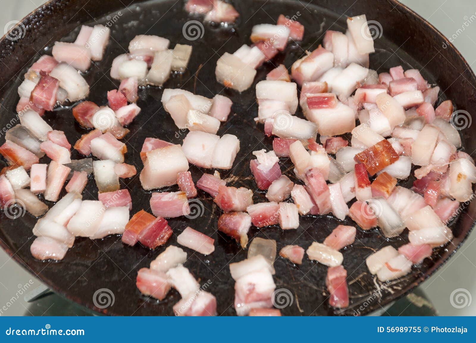 Frying Bacon Sliced on Cubes in the Frying Pan Stock Image - Image of ...