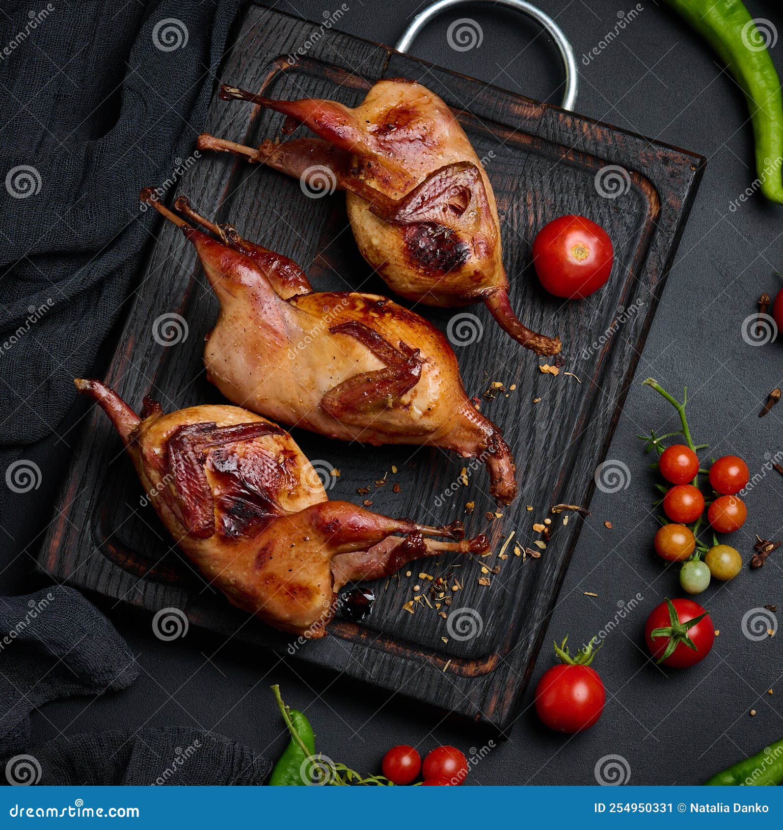 Frying Carcasses of Quails Lie on a Wooden Board with Vegetables Stock ...