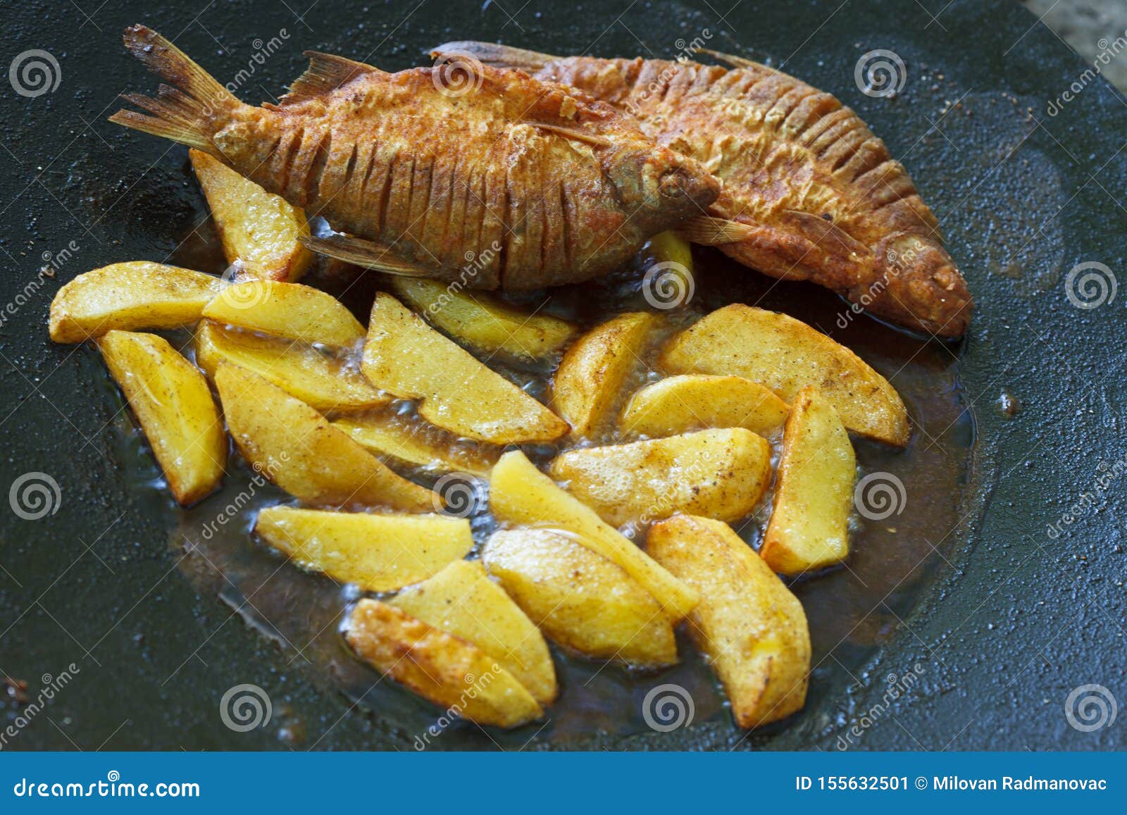 Frying Carp Fish and Potatoes in Deep Fat Stock Image - Image of deep ...