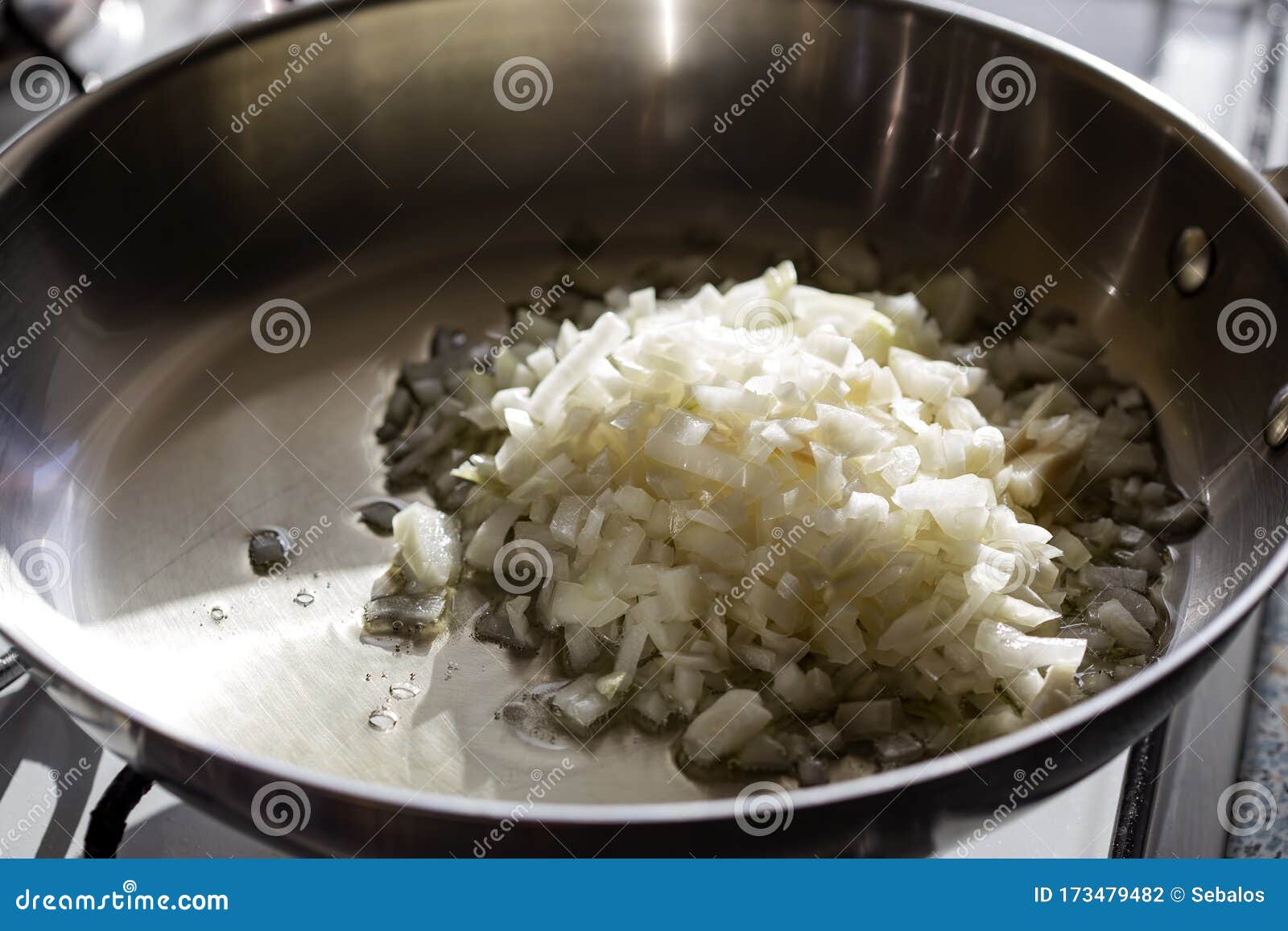 Frying Chopped Onion in Pan Stock Photo - Image of cooking, kitchen ...