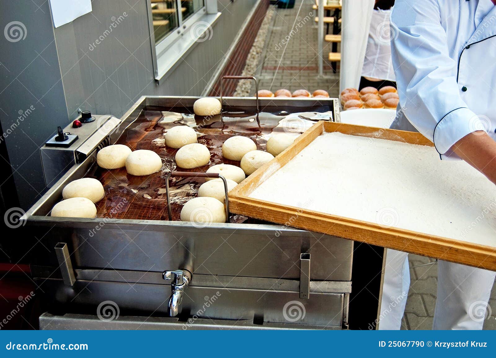 Frying of donuts stock photo. Image of calories, bakery - 25067790
