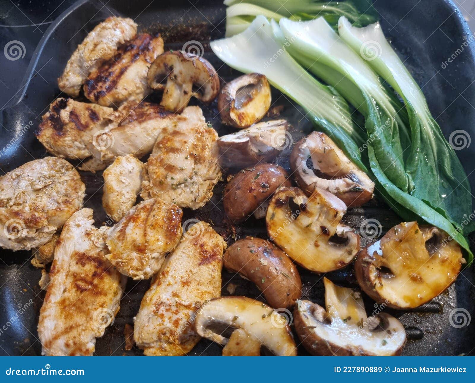 Frying food on pan stock image. Image of lunch, fish - 227890889
