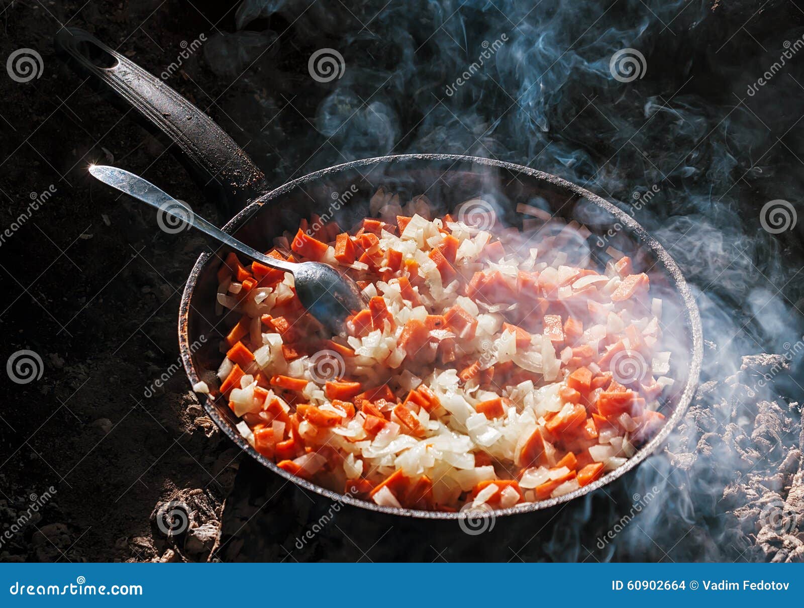 Frying pan on bonfire stock photo. Image of onion, summer - 60902664
