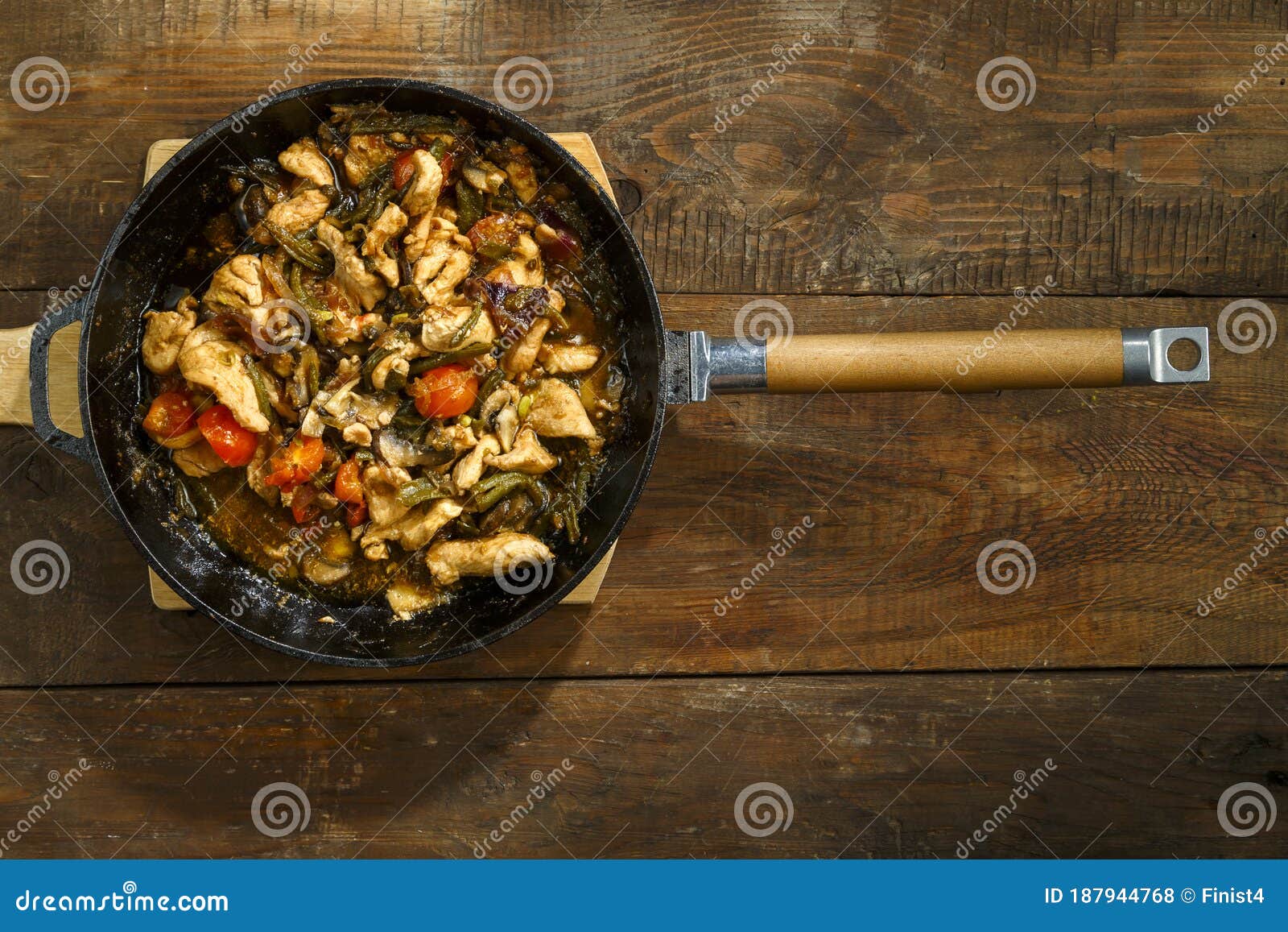 Frying Pan with Chicken and Vegetables in Pad Thai Sauce. Horizontal ...