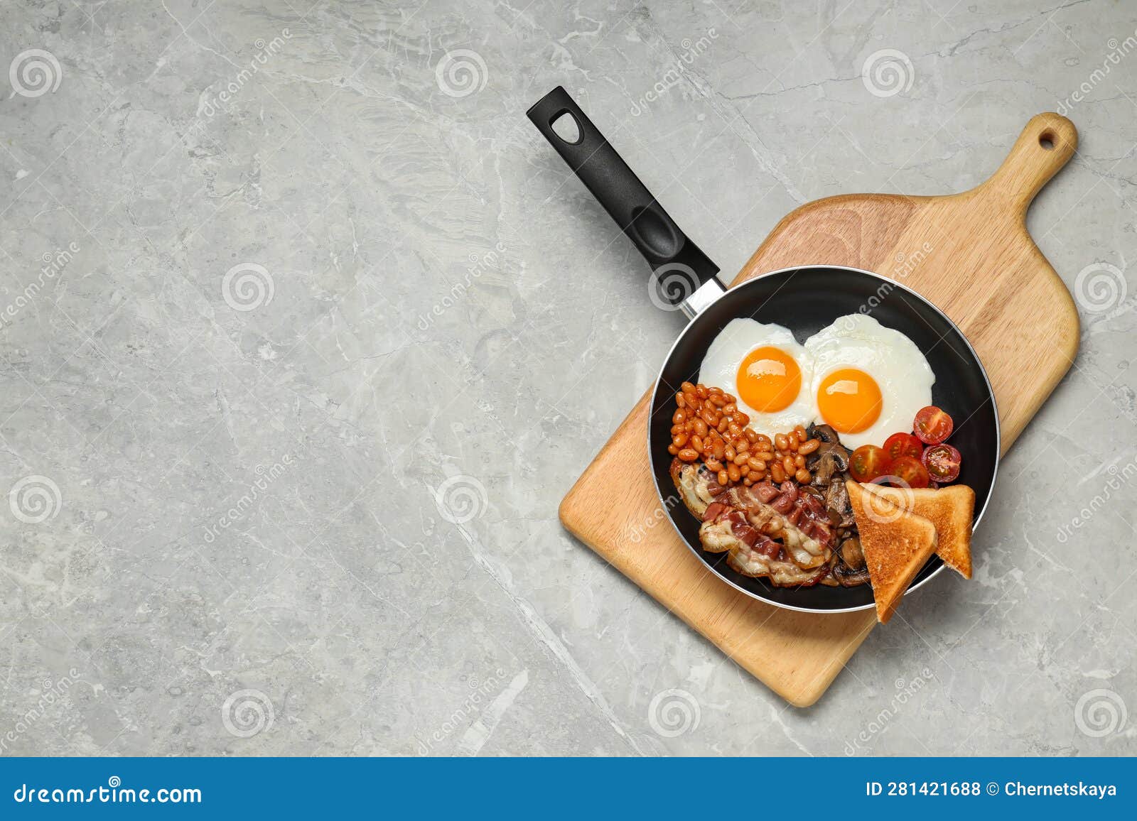 Frying Pan with Cooked Traditional English Breakfast on Grey Marble ...