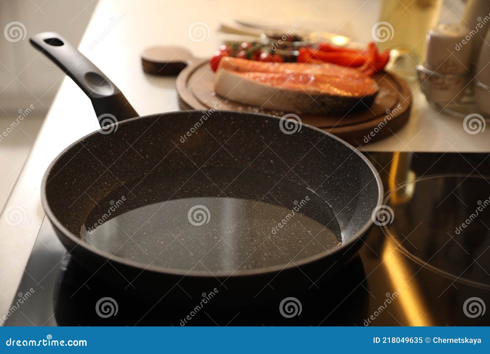 Frying Pan with Cooking Oil on Cooktop Stock Image - Image of kitchen ...