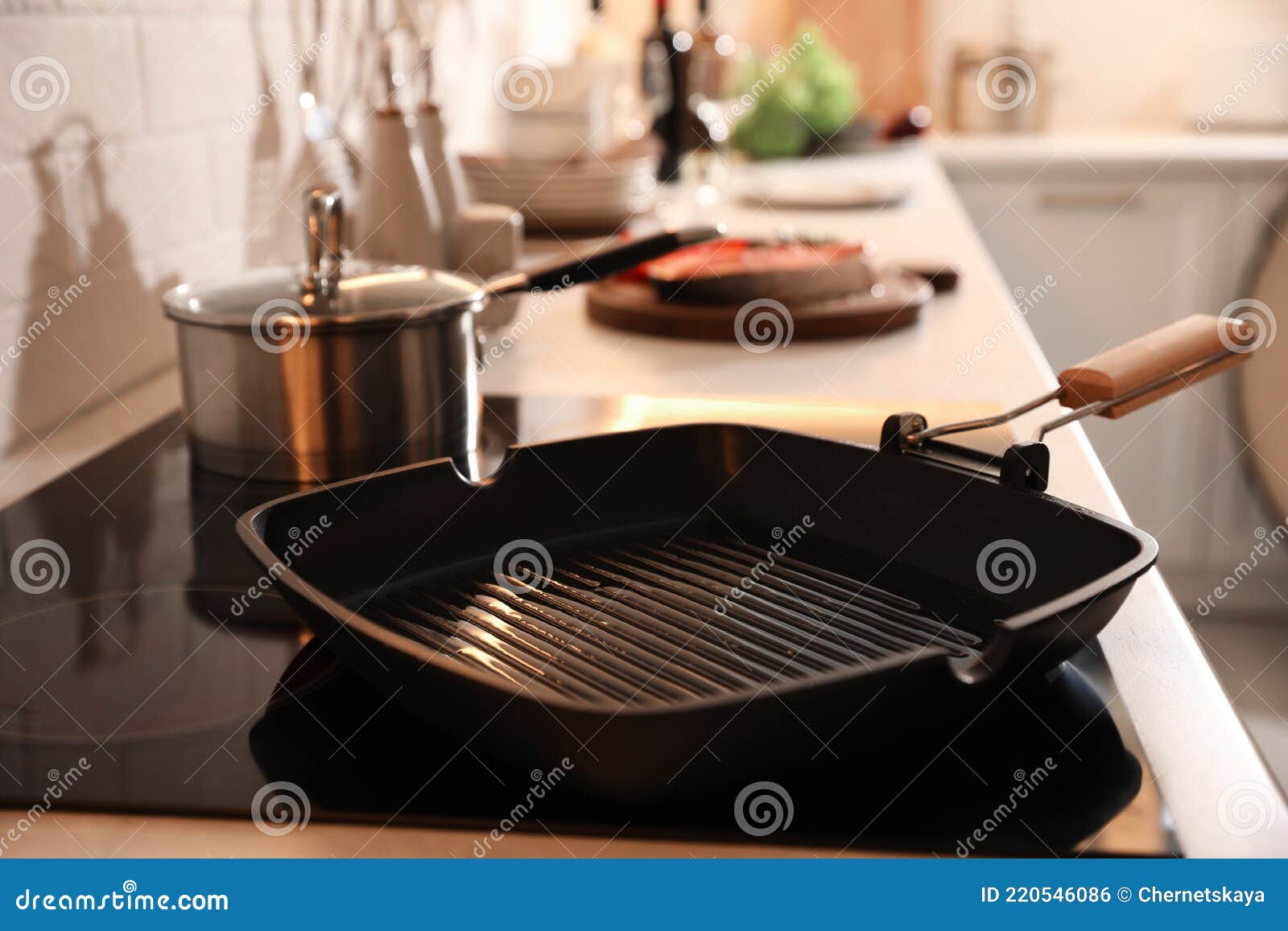 Frying Pan with Cooking Oil on Cooktop Stock Photo - Image of frying ...