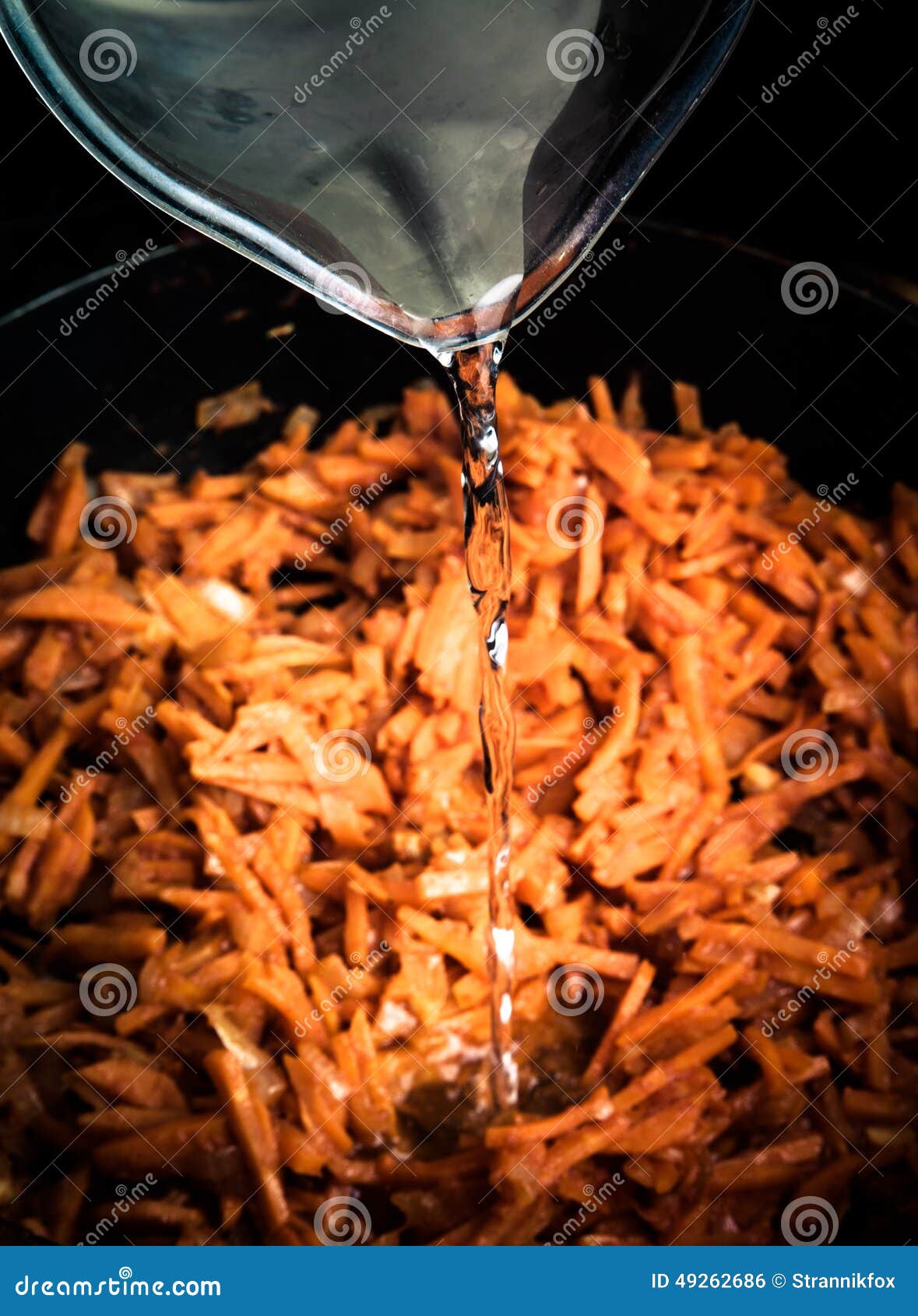 Frying Pan with Fried Carrots. Water Flowing Stock Photo - Image of ...