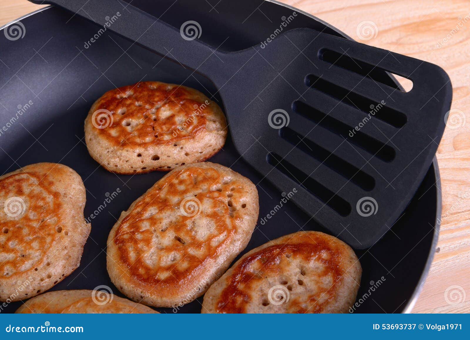 Frying pan with fritters stock image. Image of cooked - 53693737