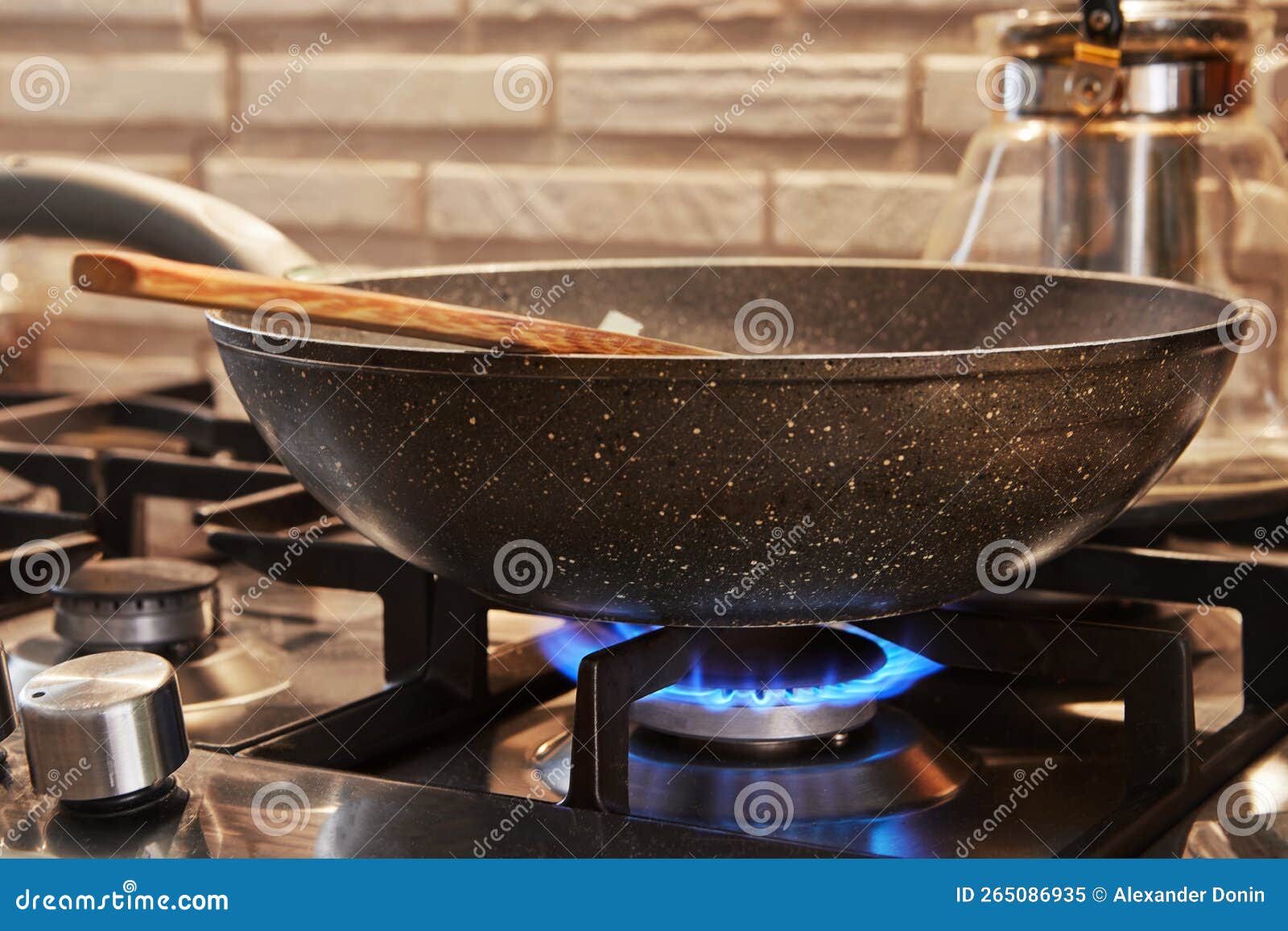 Frying Pan on Gas Stove on Fire with Dish Being Prepared Stock Image ...
