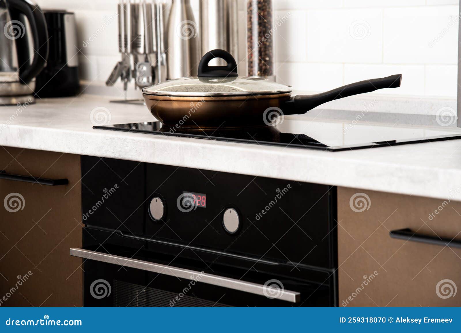 Frying Pan in Modern Kitchen with Induction Stove Stock Photo - Image ...