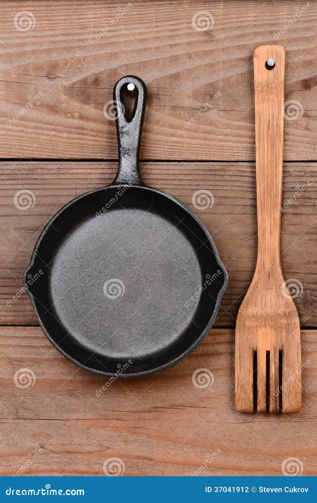 Frying Pan and Wood Fork stock photo. Image of worn, utensil - 37041912