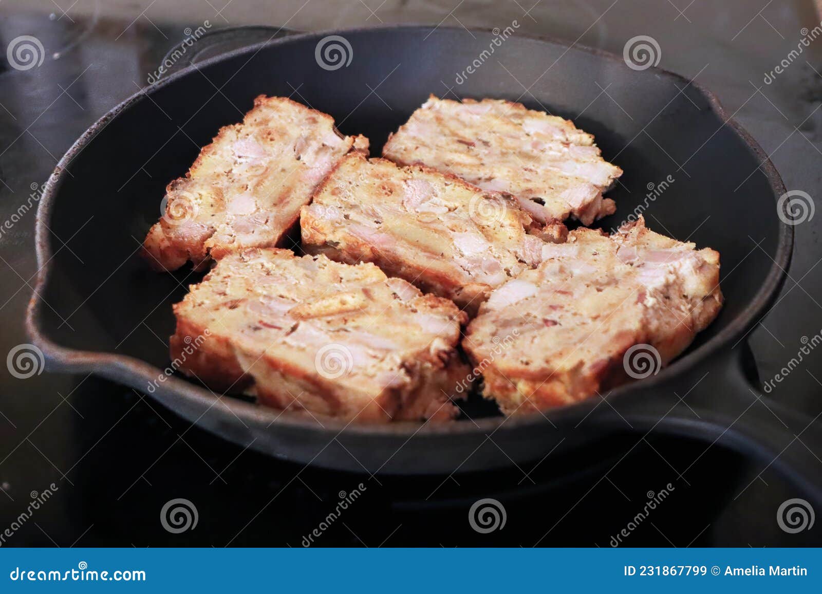 Frying Scrapple Slices on a Cast Iron Pan Stock Image - Image of ...