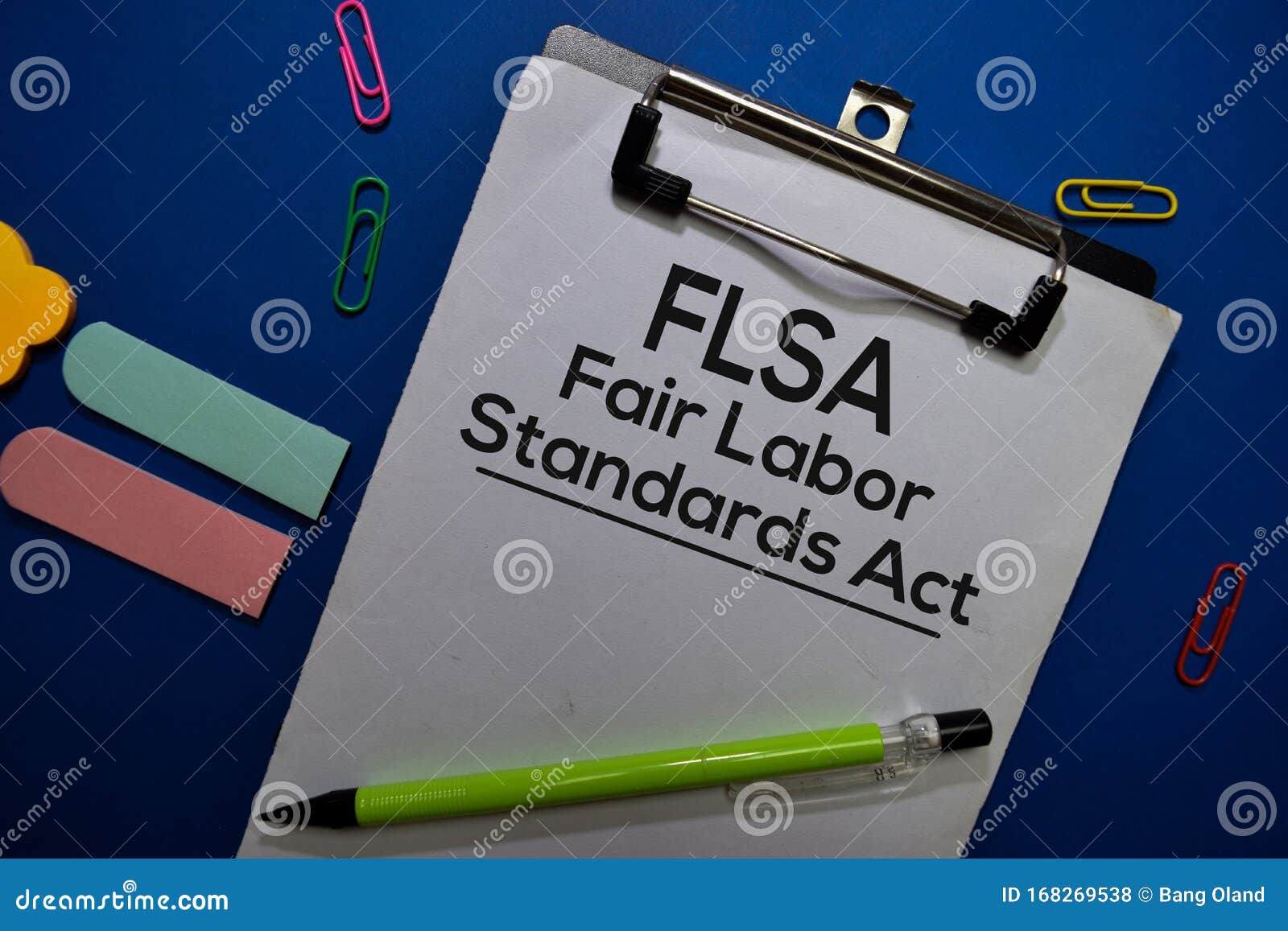 FSLA - Fair Labor Standards Act Write on a Paperwork Isolated on Office ...