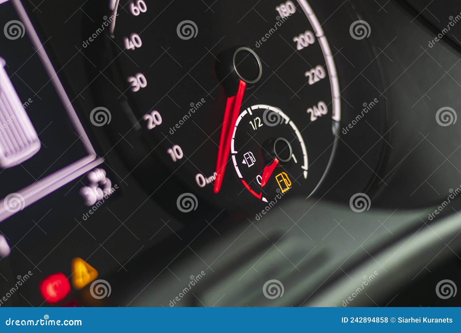 Fuel Discharge Warning Light on the Dashboard of the Car. the Low Fuel ...
