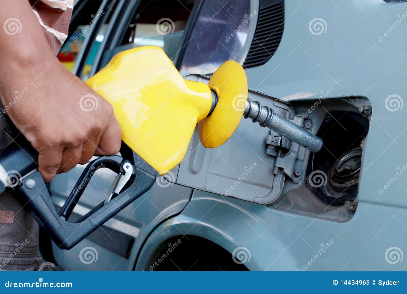 Fuel filling stock image. Image of benzine, fuel, hand - 14434969