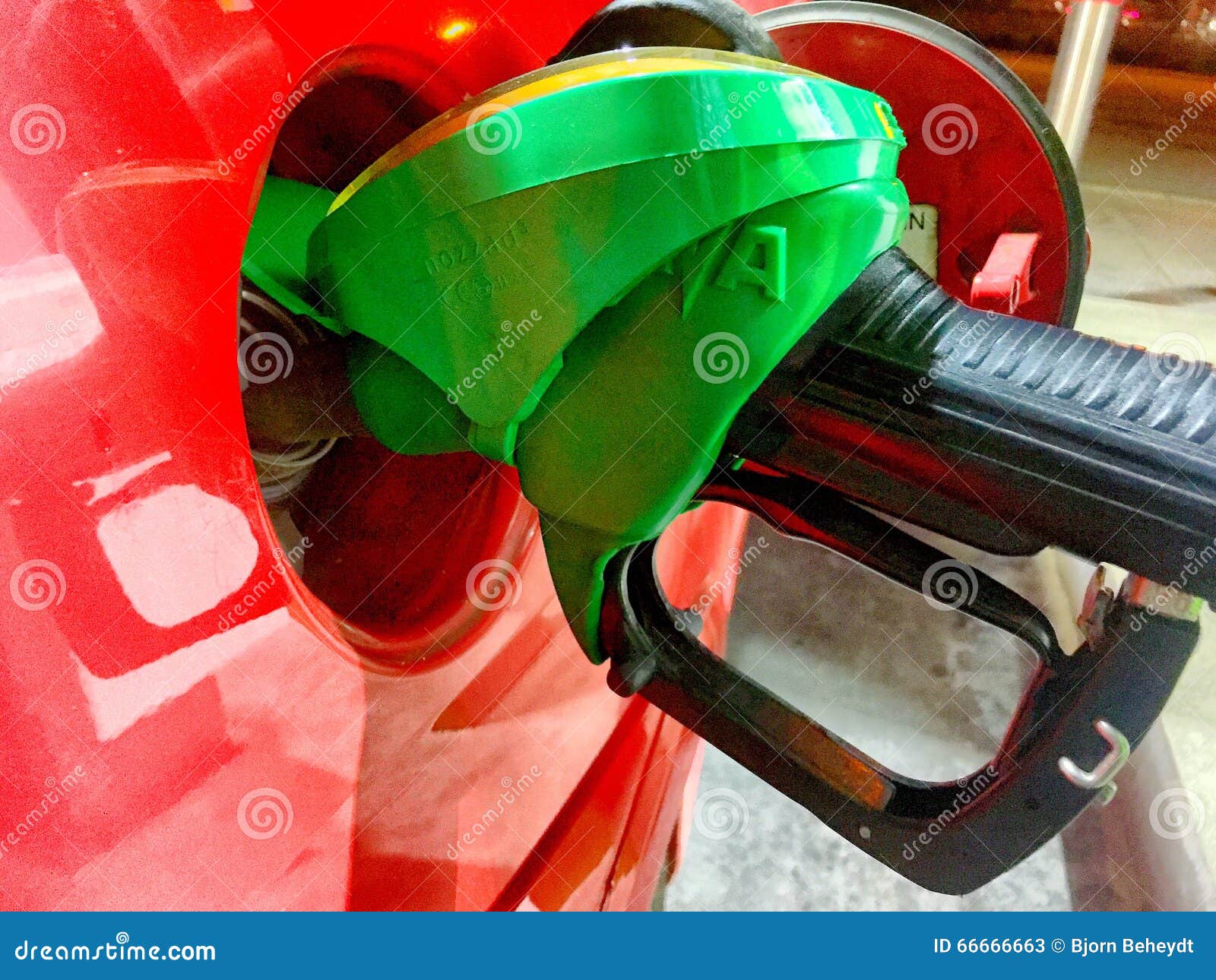 Fueling up editorial stock photo. Image of vehicle, nozzle - 66666663
