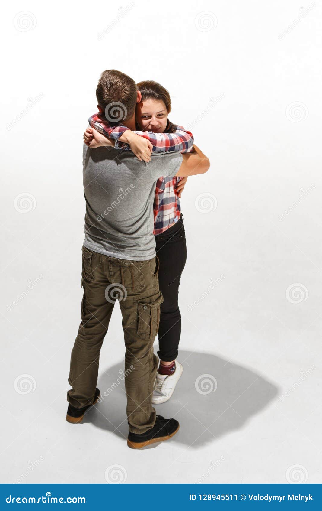 Full Body Portrait of Hugging Couple with Smile. Caucasian Models in ... Full Body Portrait of Hugging Couple with Smile. Caucasian Models in ...